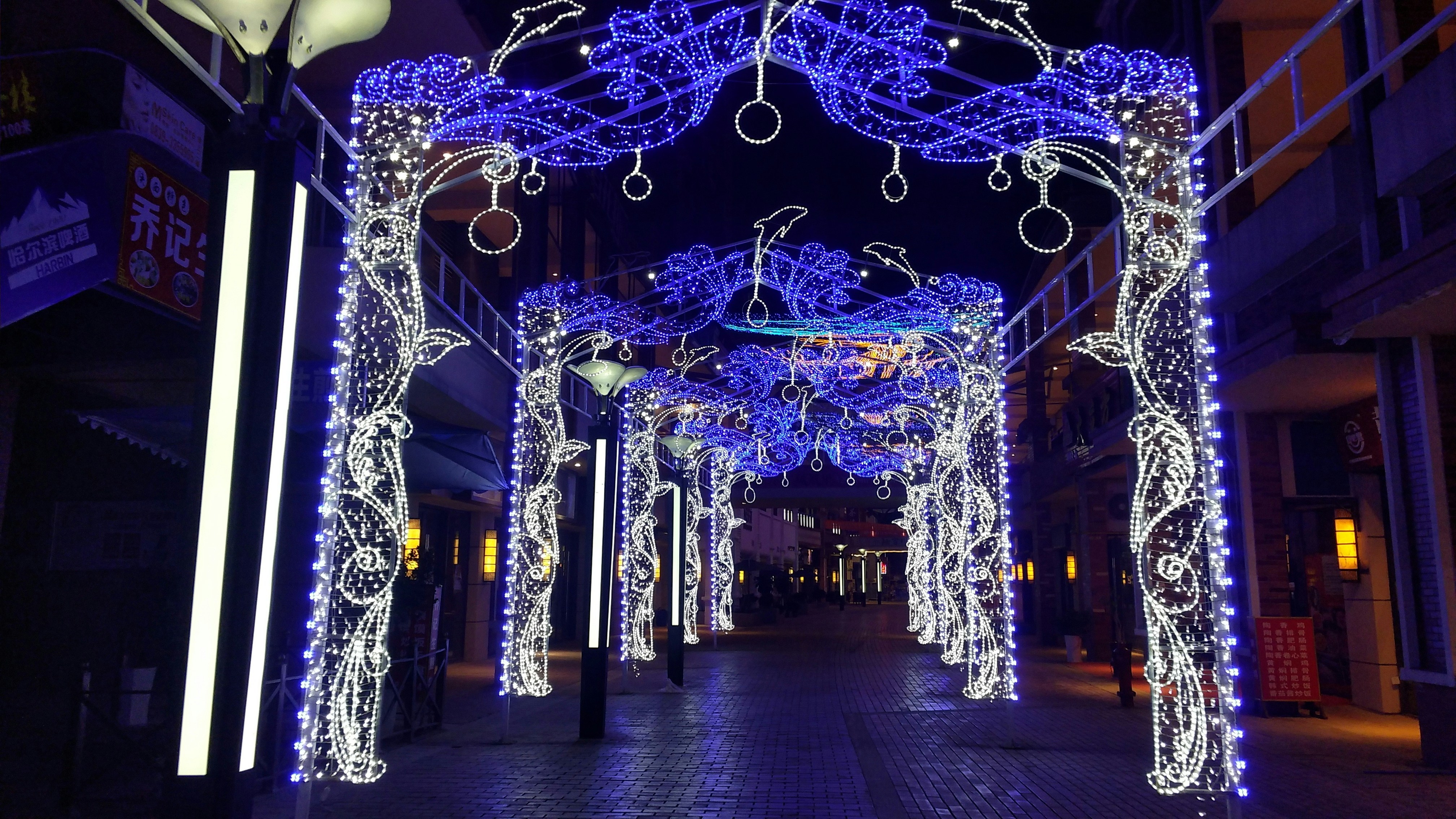 White and blue string lights pillars turned-on photo – Free China Image ...
