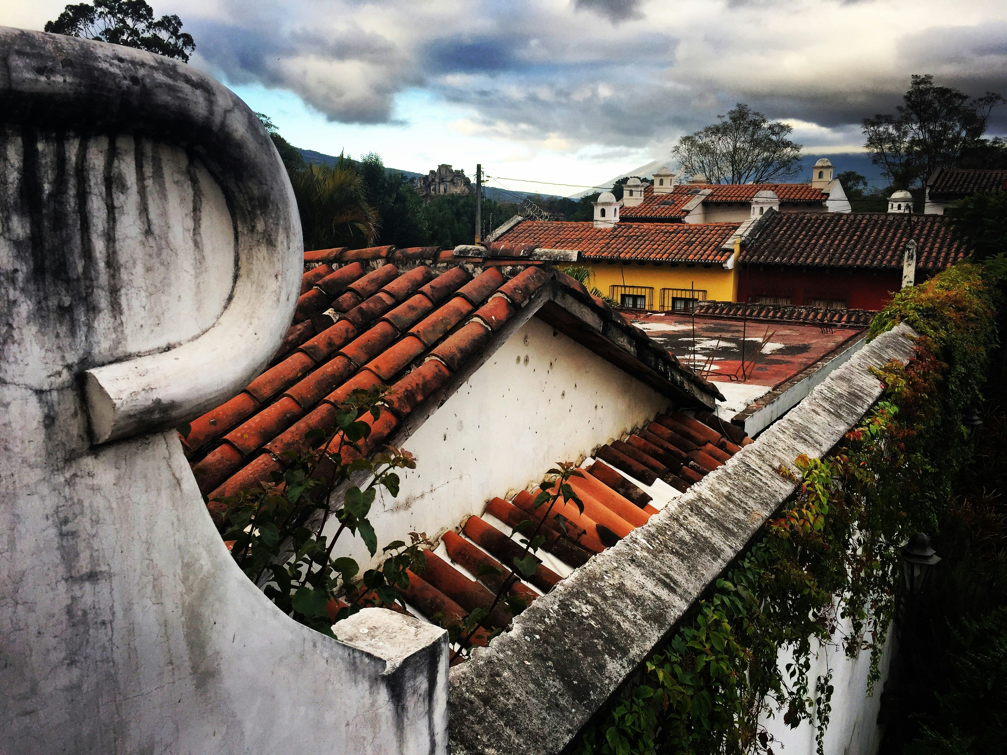 Terracotta Rooftops Under a Brooding Sky