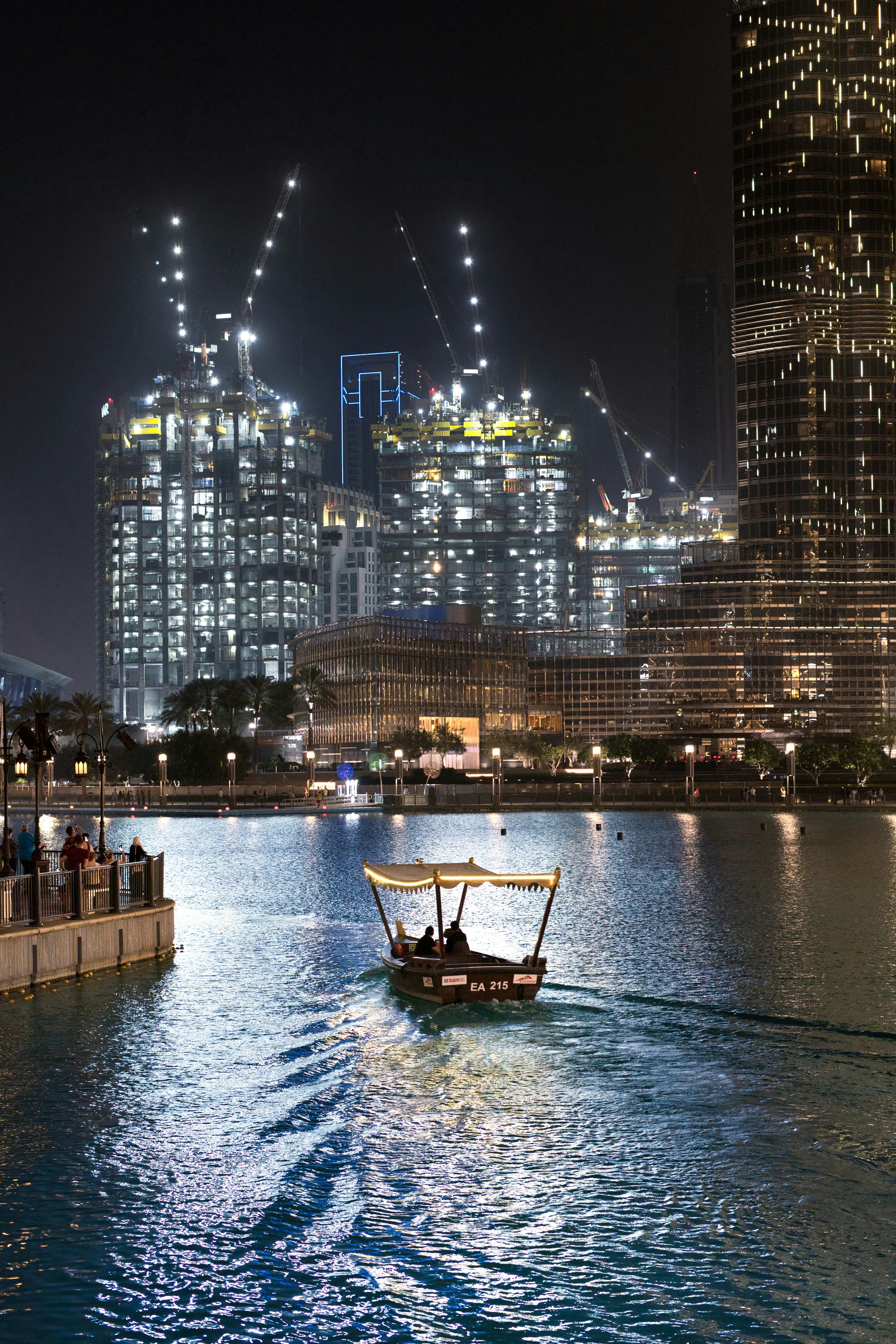 People riding on boat on river during nighttime photo – Free Grey Image ...
