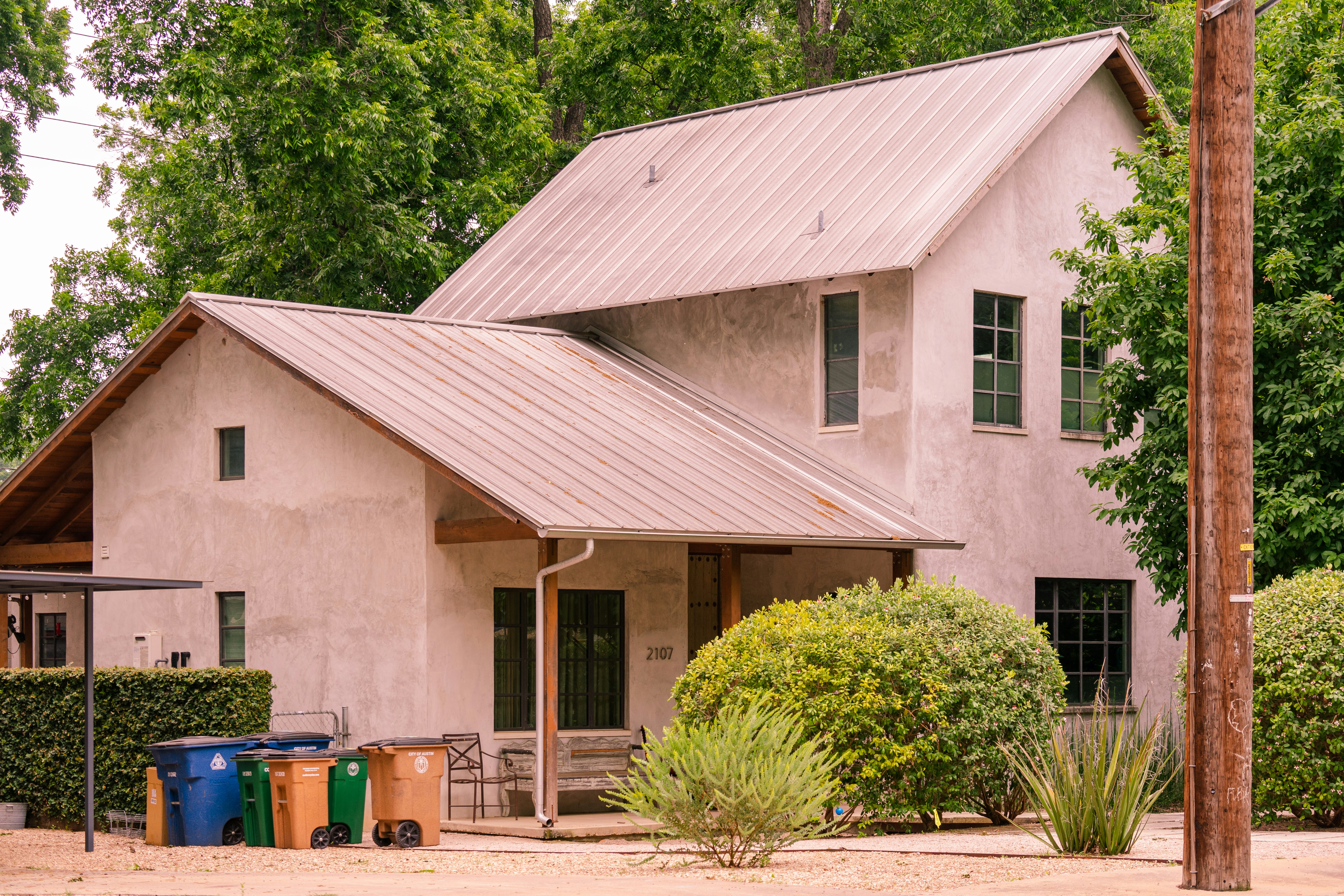 Pastel Pueblo Under a Pink Metal Roof: A Quiet Southwestern Home