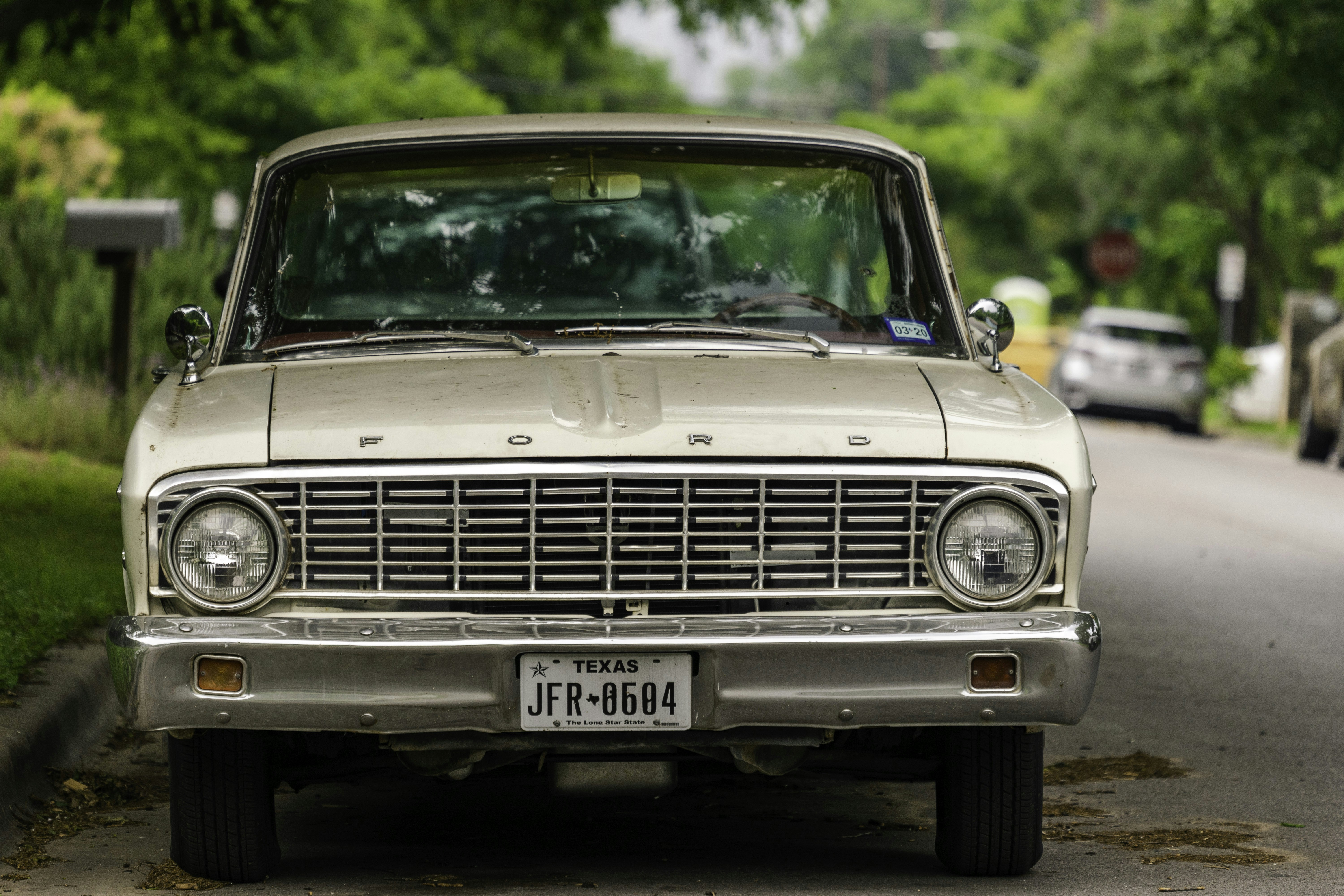Shallow focus photo of silver Ford car photo – Free Usa Image on Unsplash