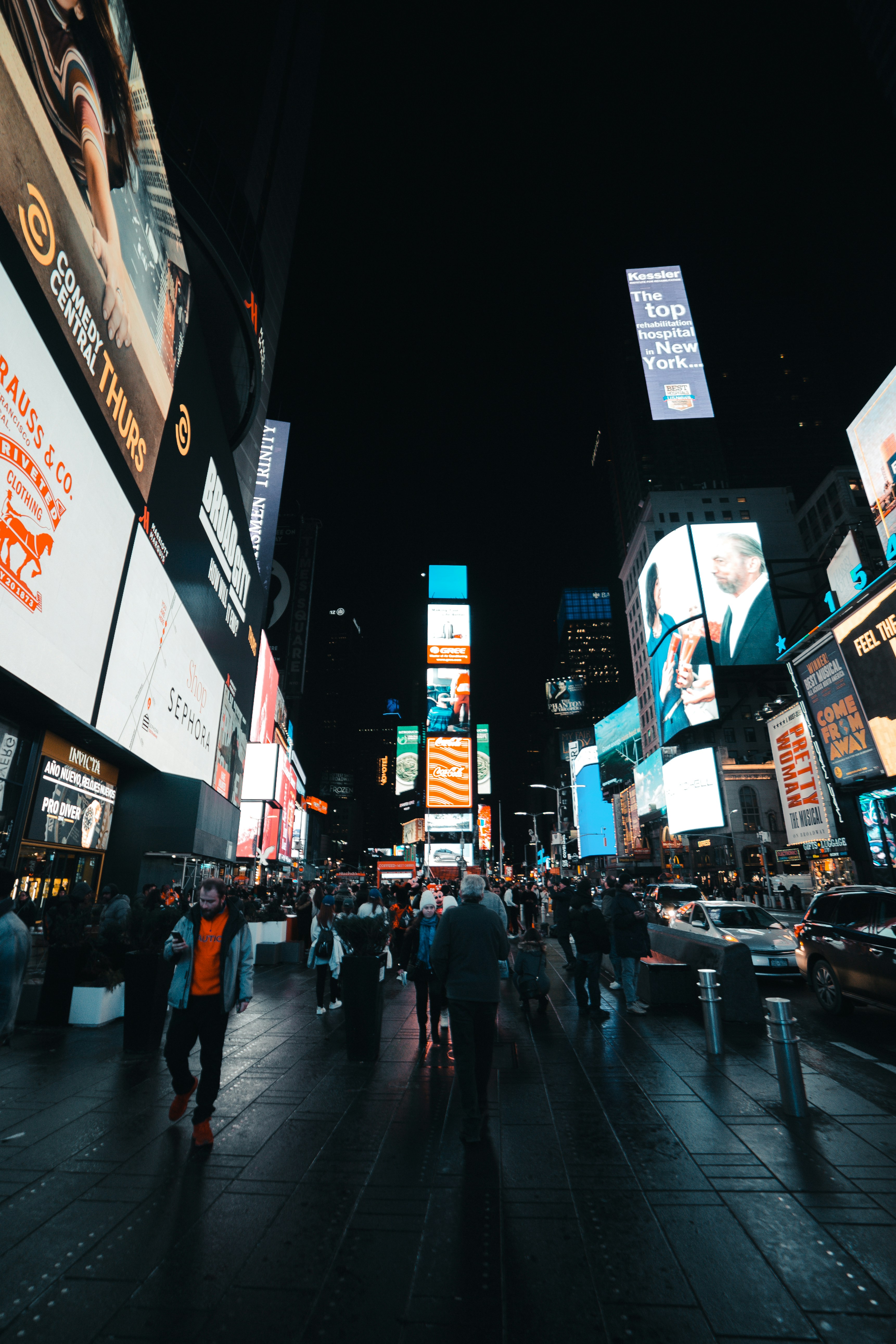 People walking between buildings photo – Free City Image on Unsplash