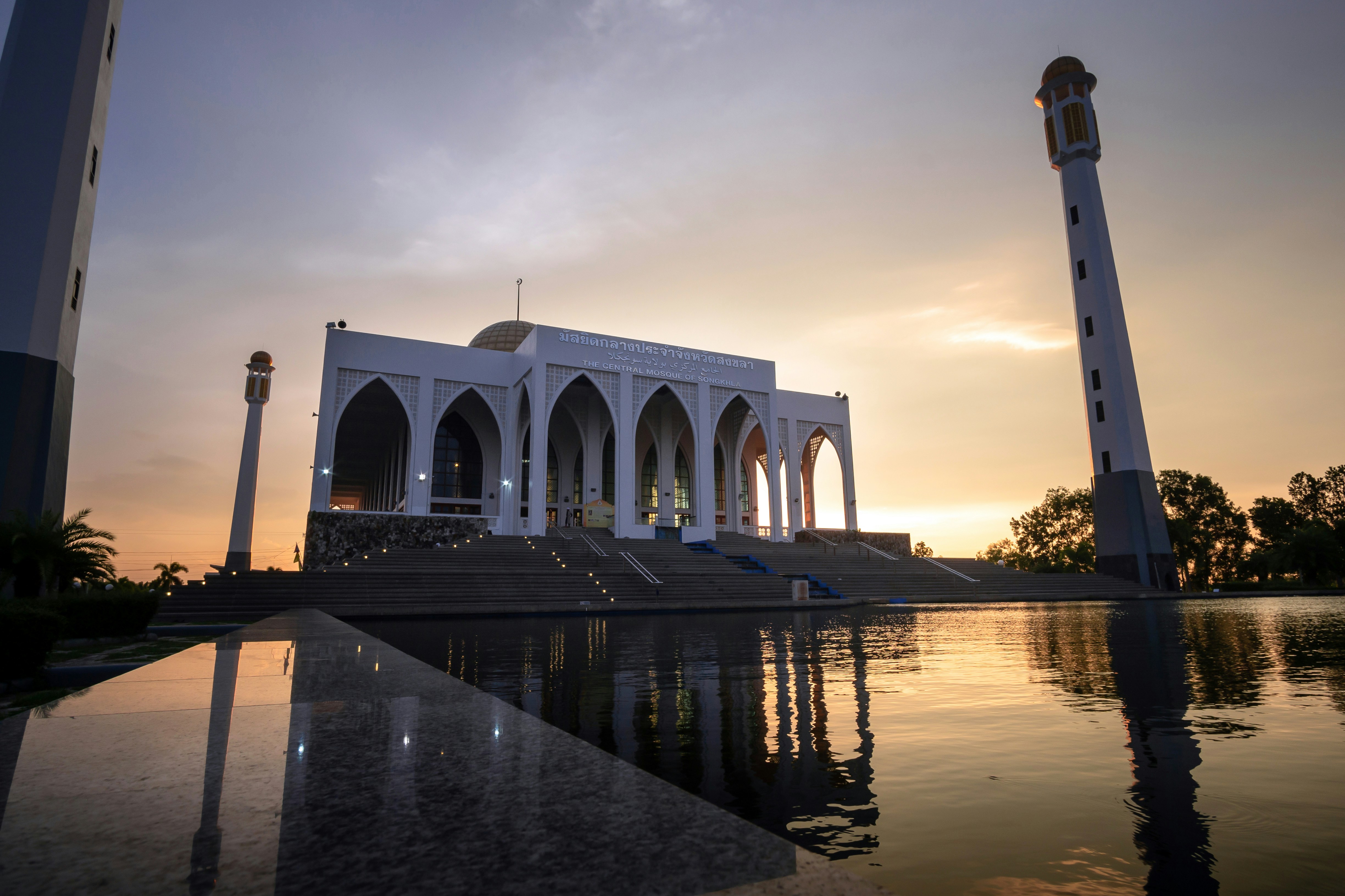 Dusk at the White Mosque: Archways Reflect in a Quiet Pool