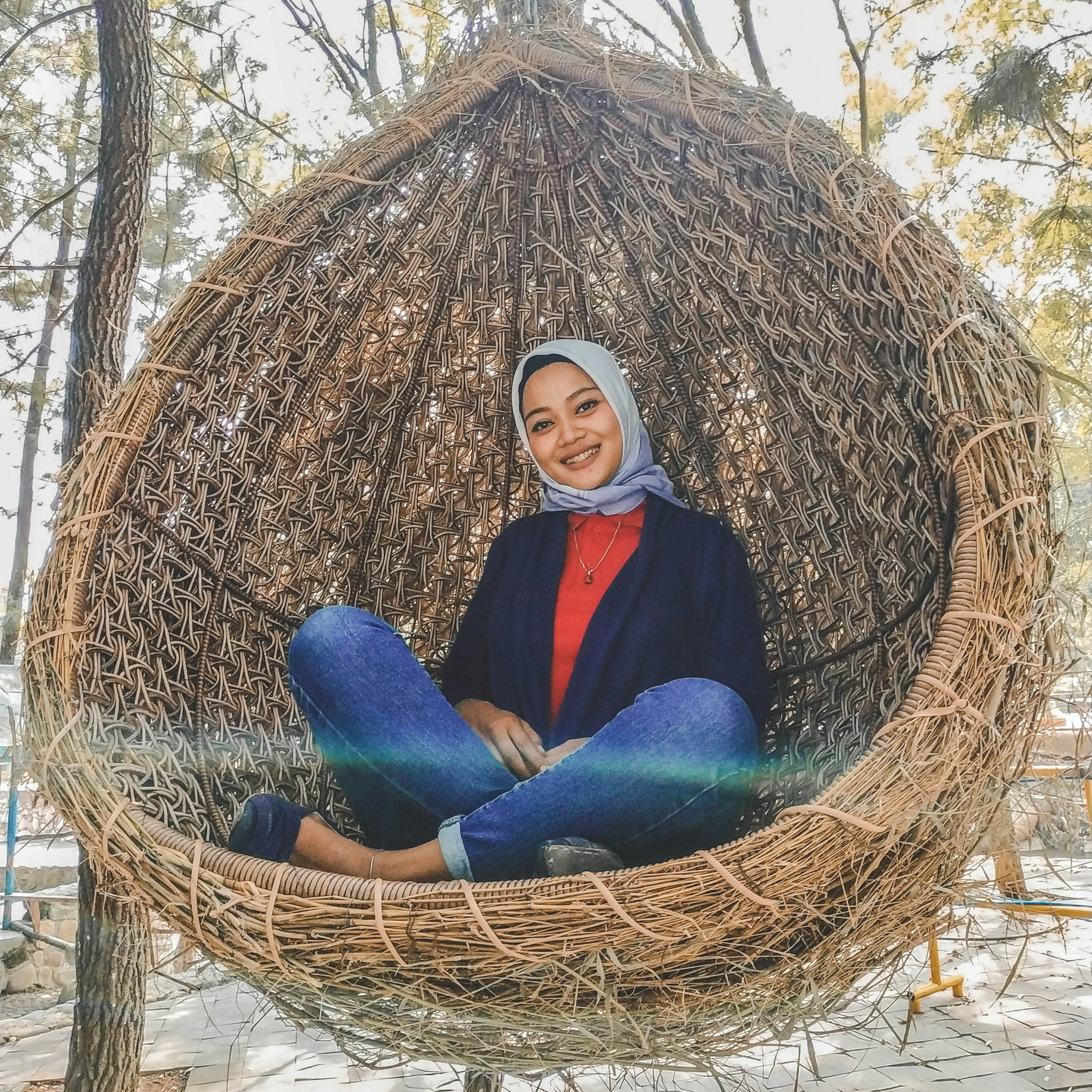 Forest Cocoon: A Warm Smile in a Woven Nest