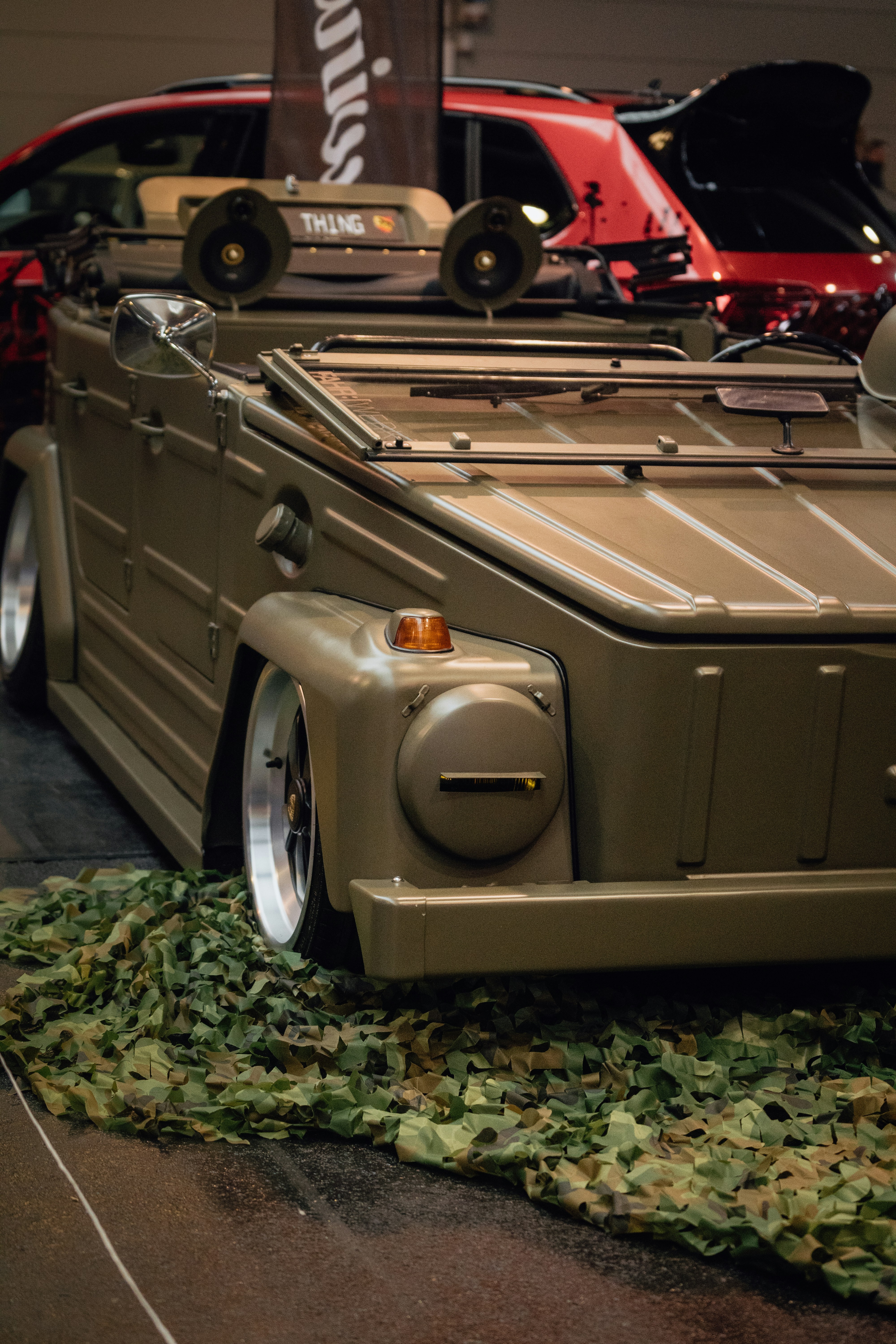 Olive Armor on Display: A Vintage Armored Carrier at the Expo