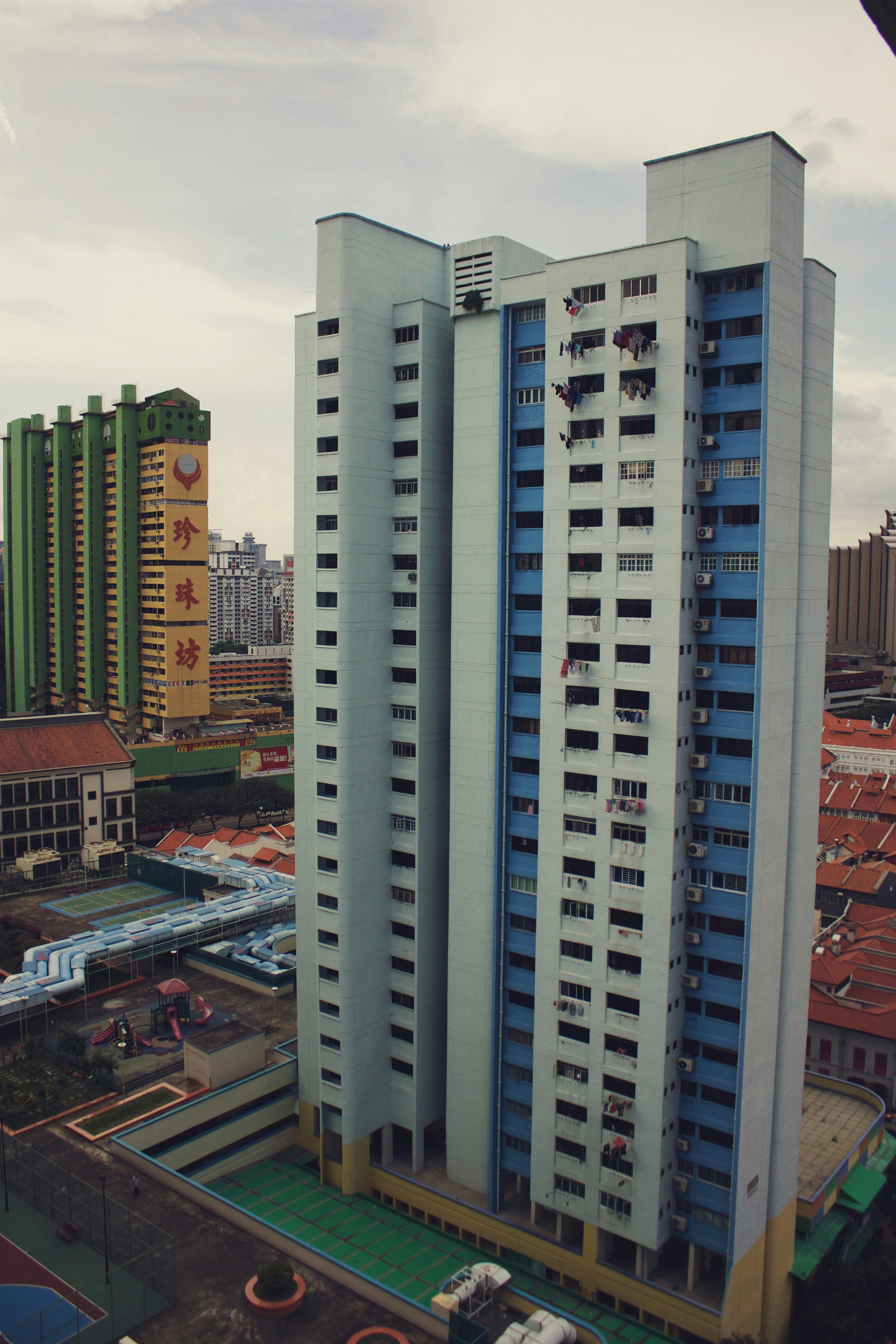 Blue Spine Rising: A Towering City Block Reaches Skyward