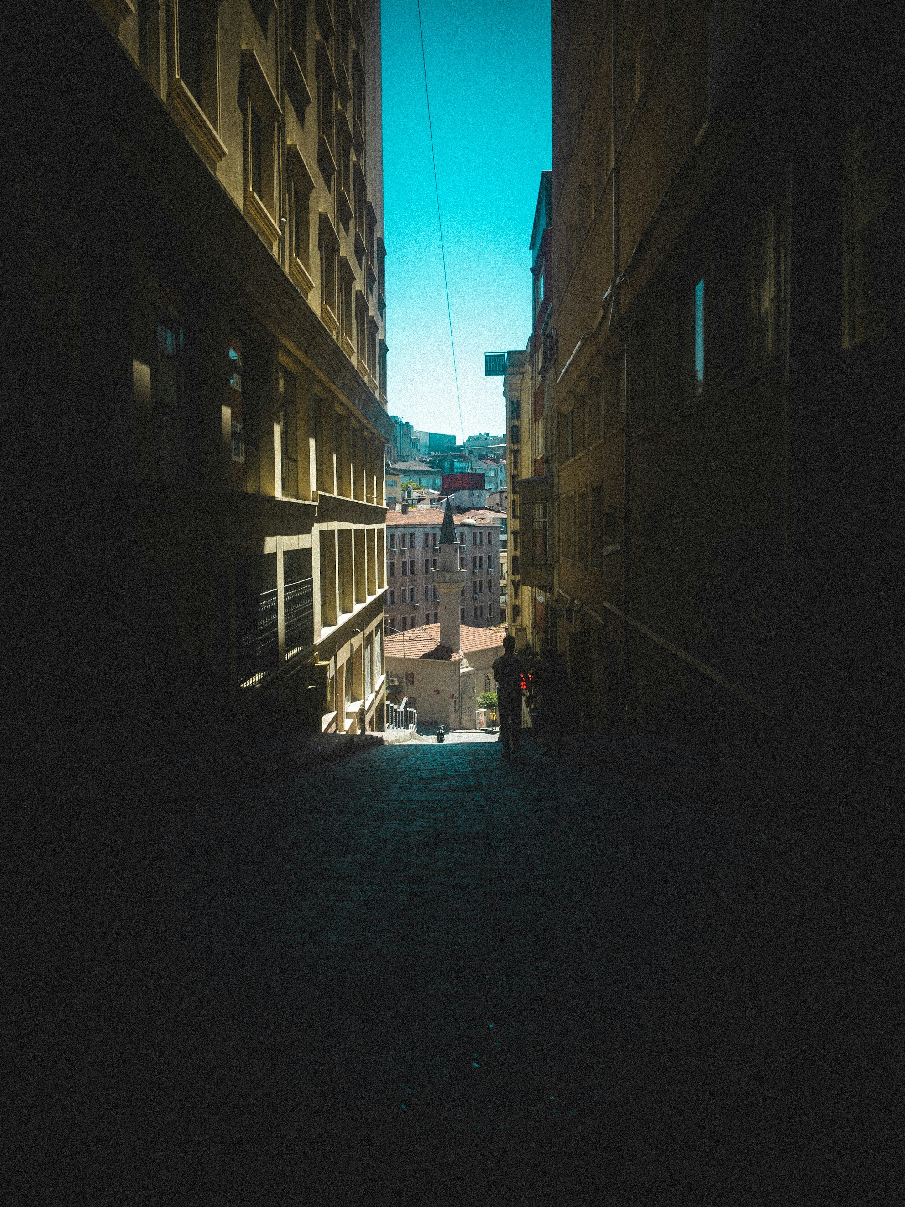 Dark walkway between buildings photo – Free Street Image on Unsplash