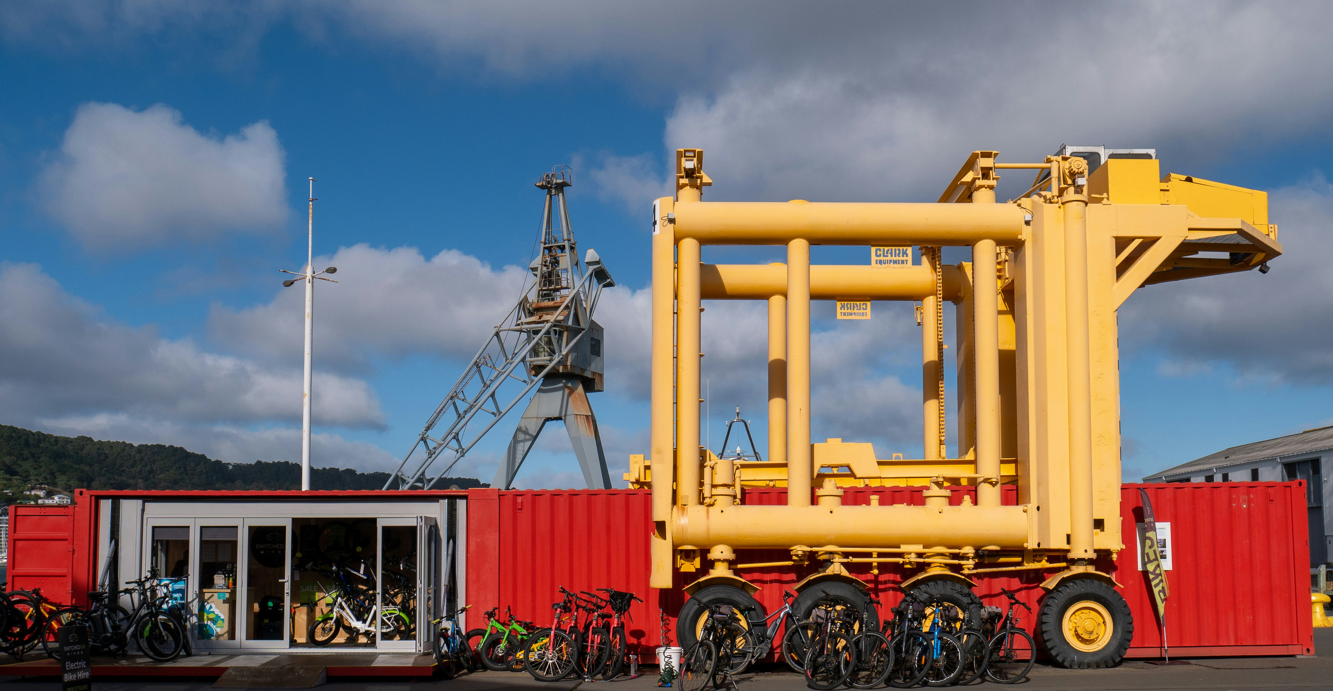 Crane Carriage at Dockside: A Palette of Red, Yellow, and Steel