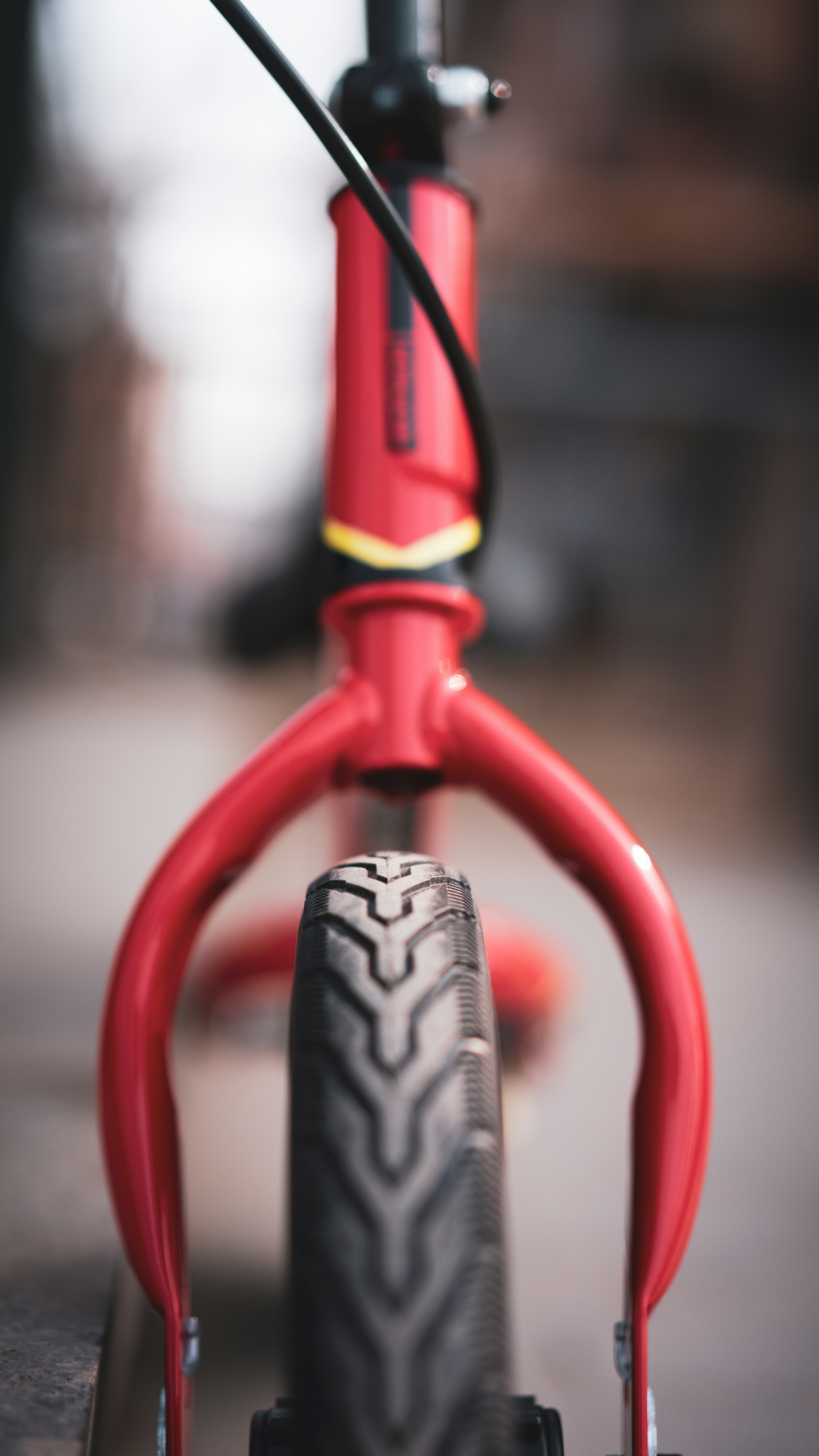 selective focus photography of red bicycle