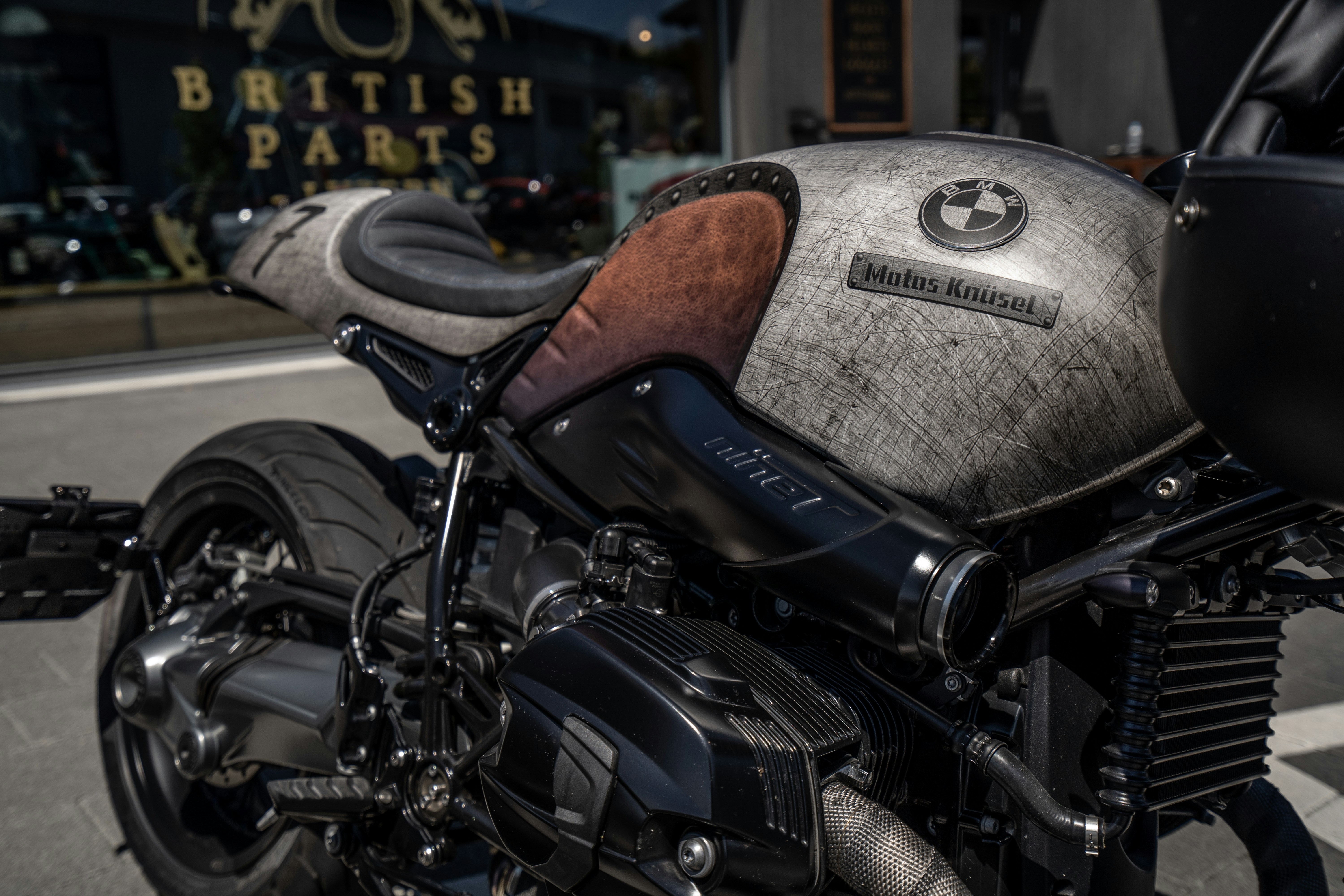 Patina and Power: Close-Up on a Weathered BMW Motorcycle Tank