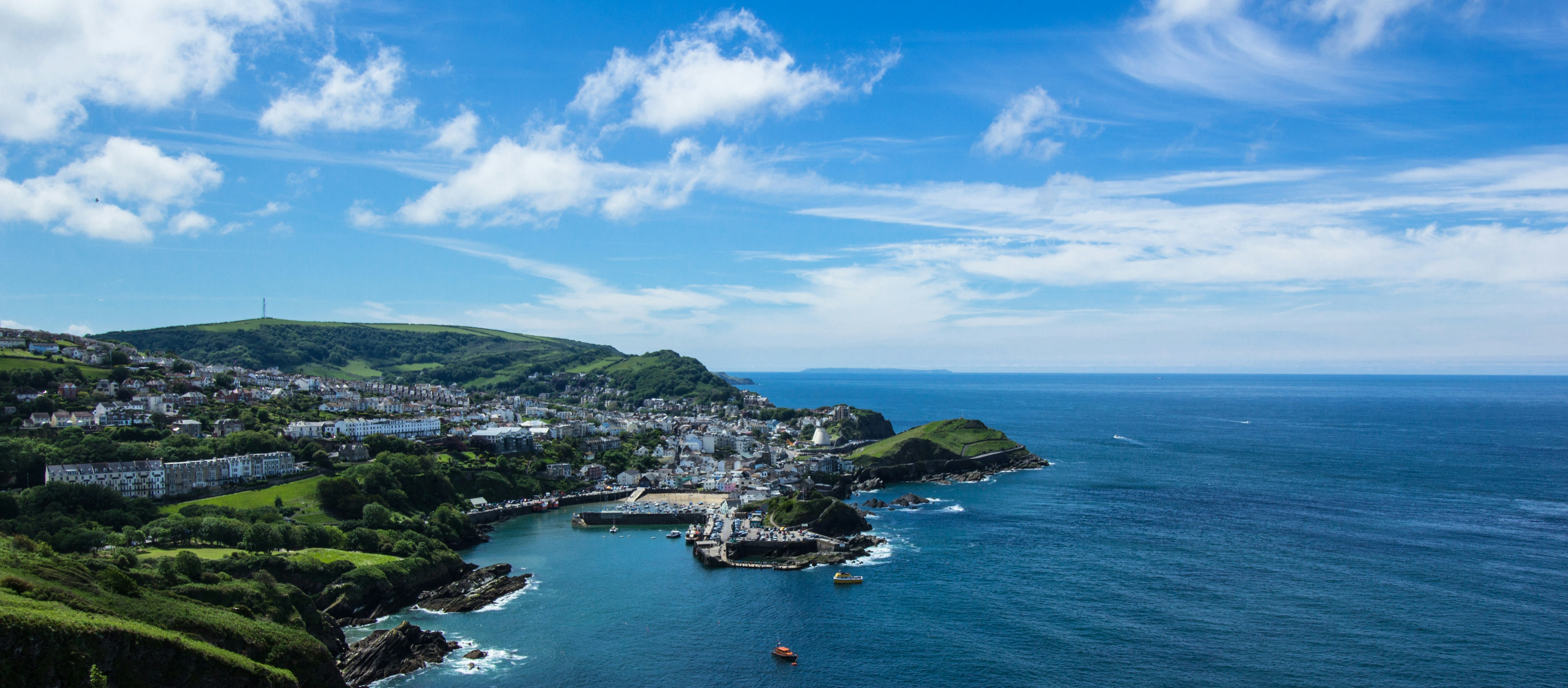 Harbor's Edge: A Cliffside Town Meets the Atlantic