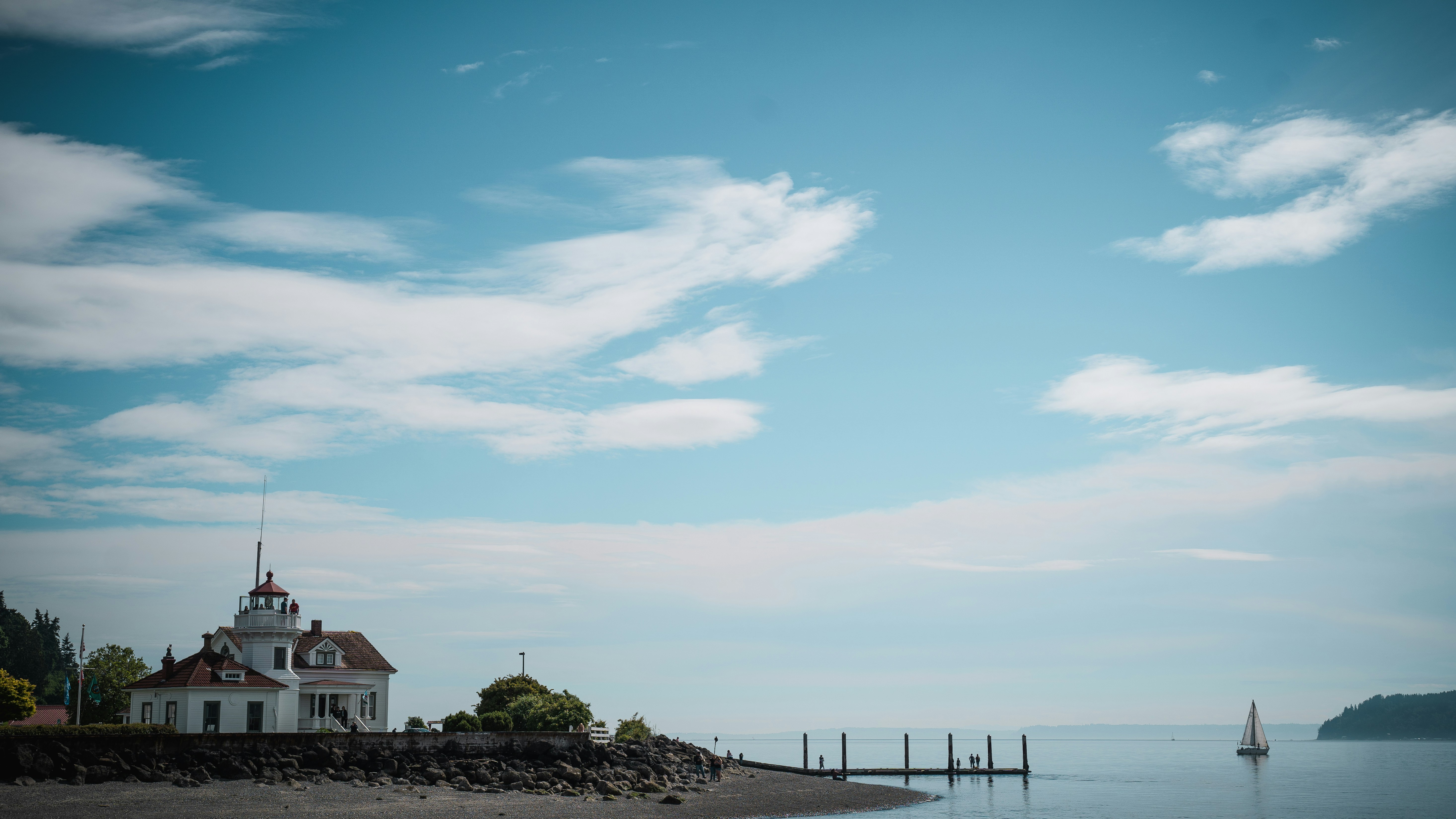 Landscape photo of a seaside building with a dock photo – Free Blue ...