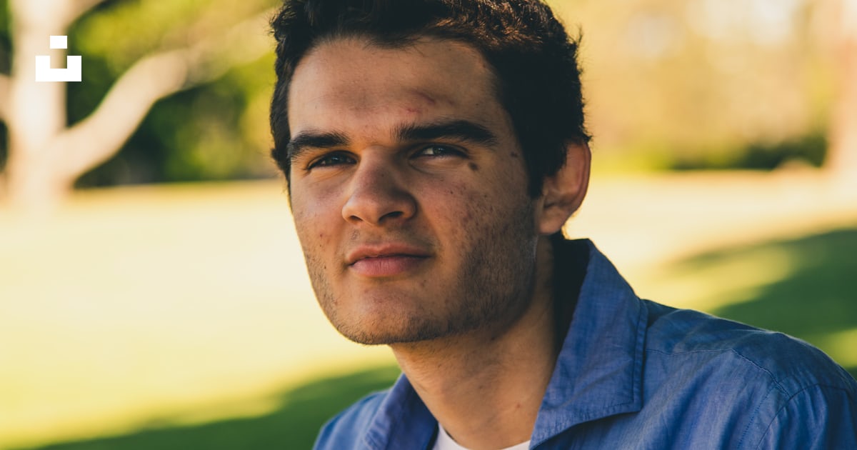 Selective Focus Photography Of Man Wearing Blue Dress Shirt Photo