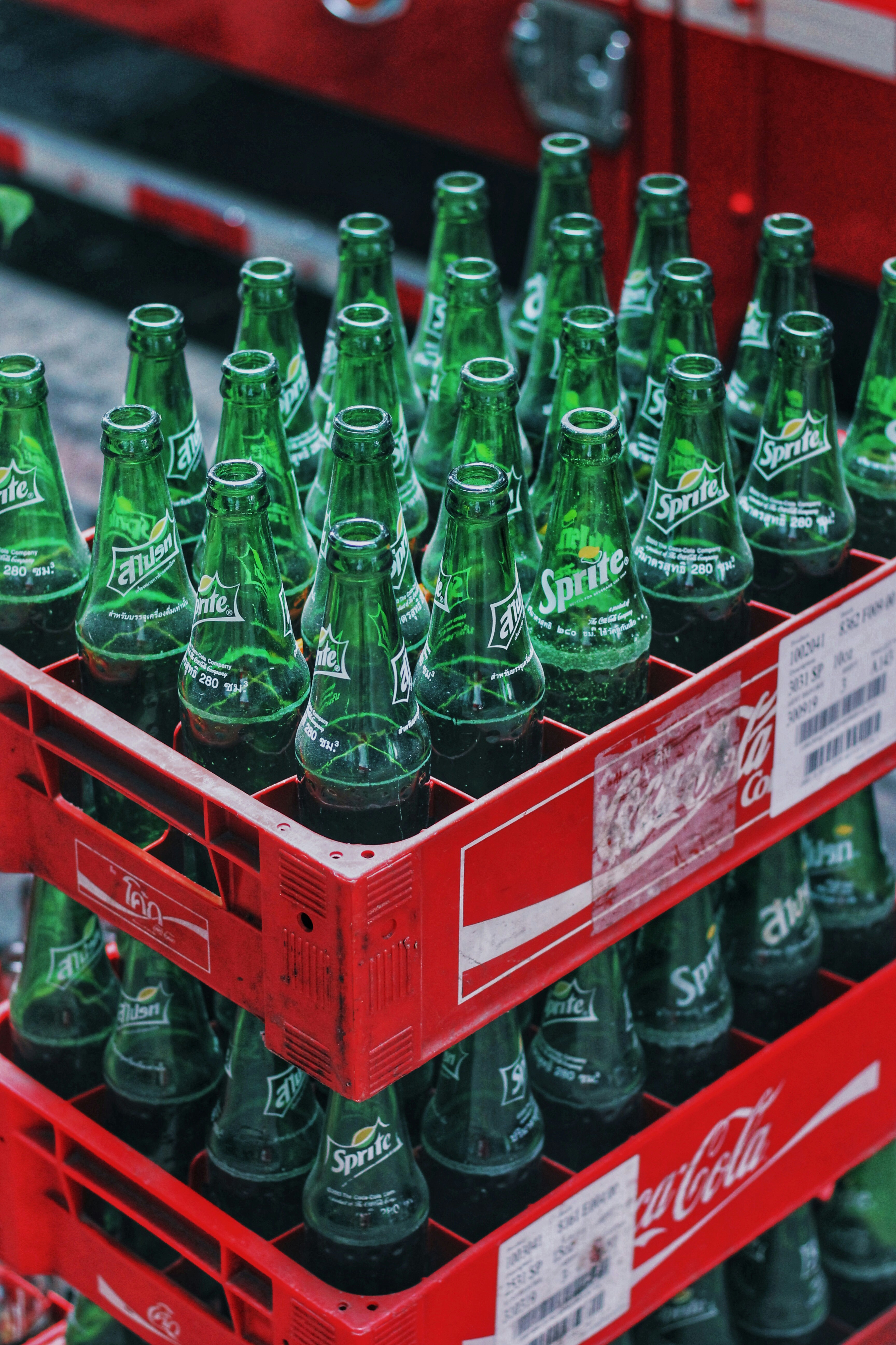 Sprite glass bottles in red crates photo – Free Beverage Image on Unsplash
