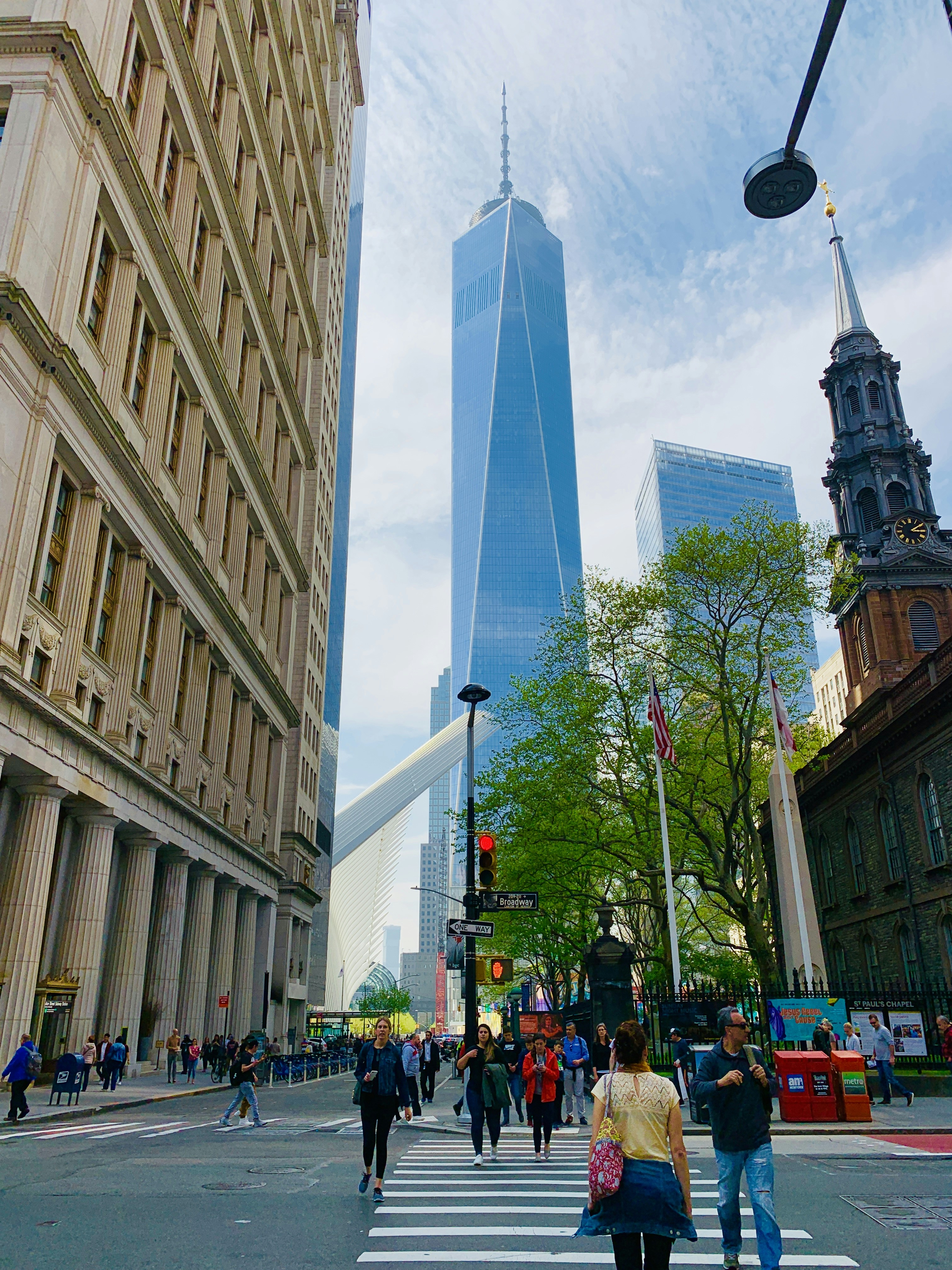 People crossing across gray tower building photo – Free Building Image ...
