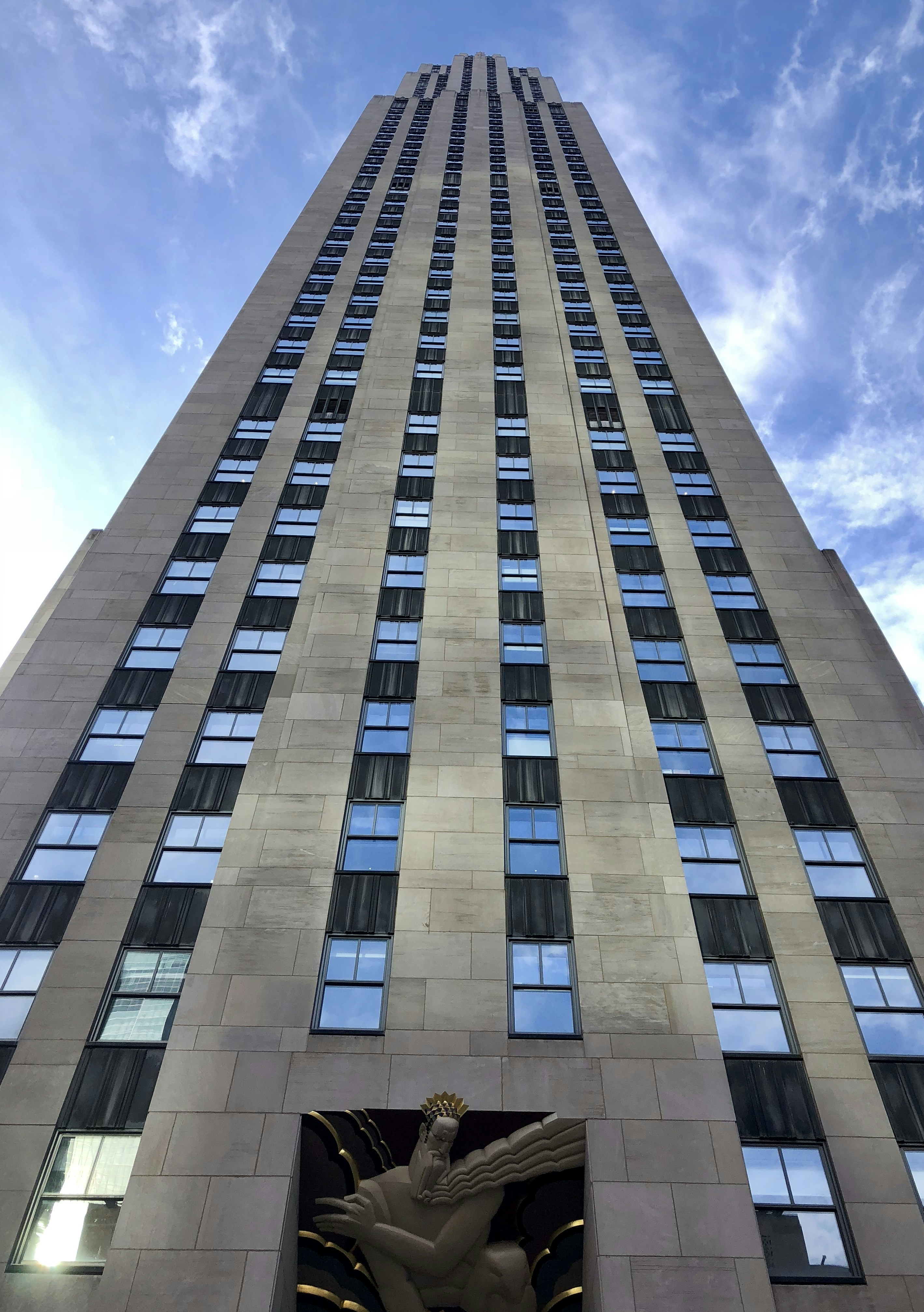 Towering Facade: A Vertical Perspective of a Skyscraper