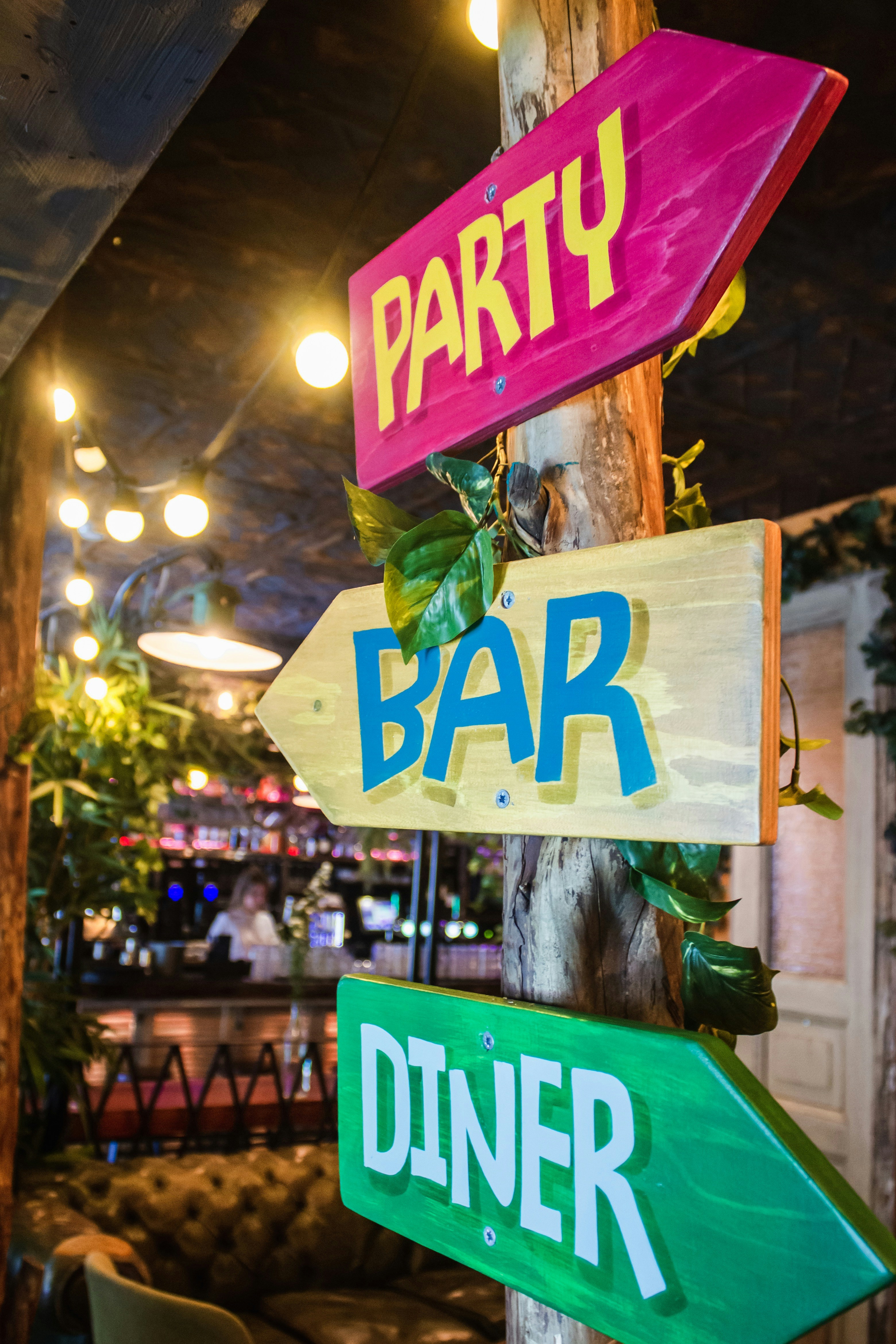 Shallow focus photo of party bar diner signage photo – Free Human Image ...