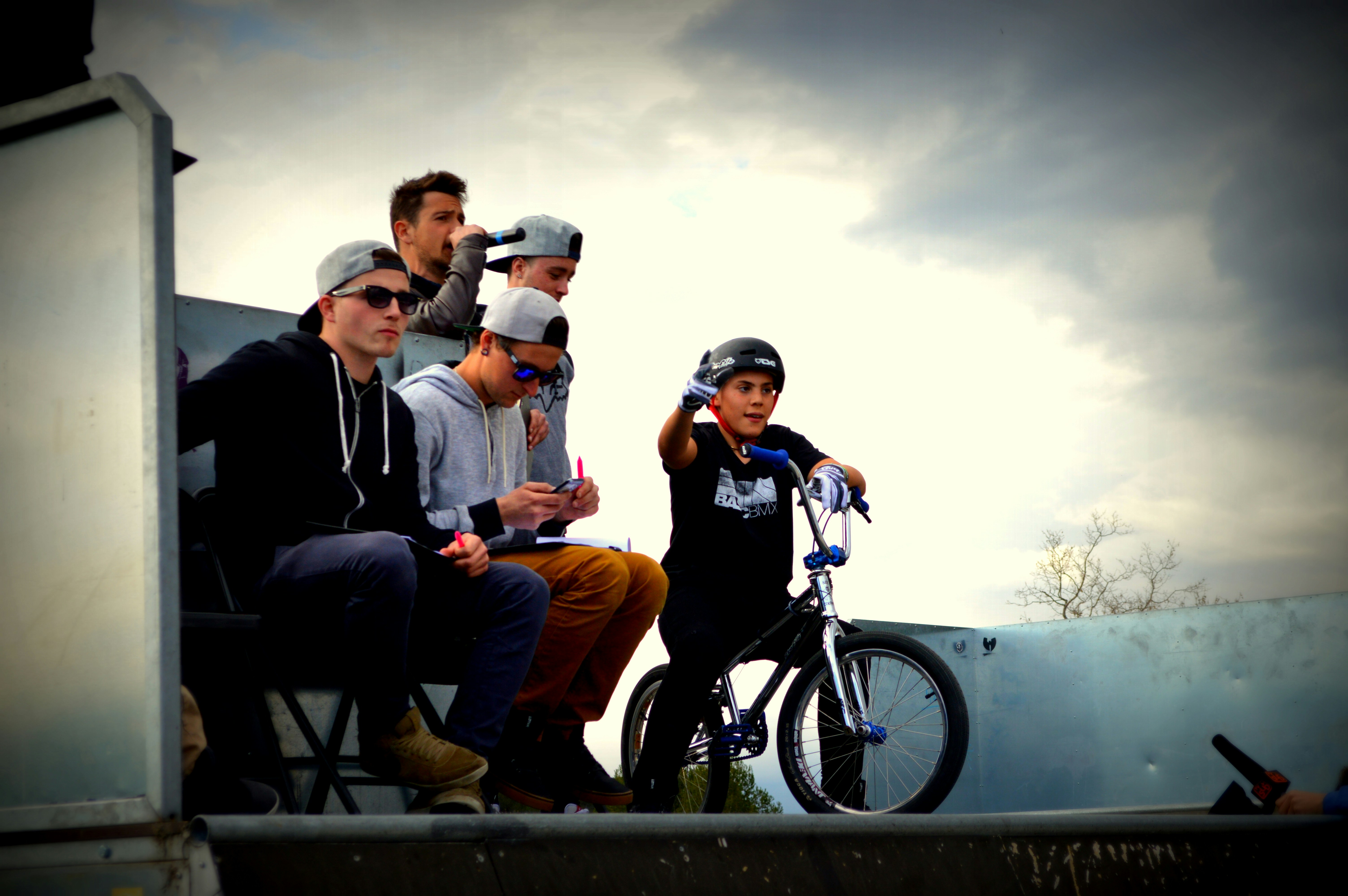 Rally at the Ramp: A BMX Crew Watches on the Edge