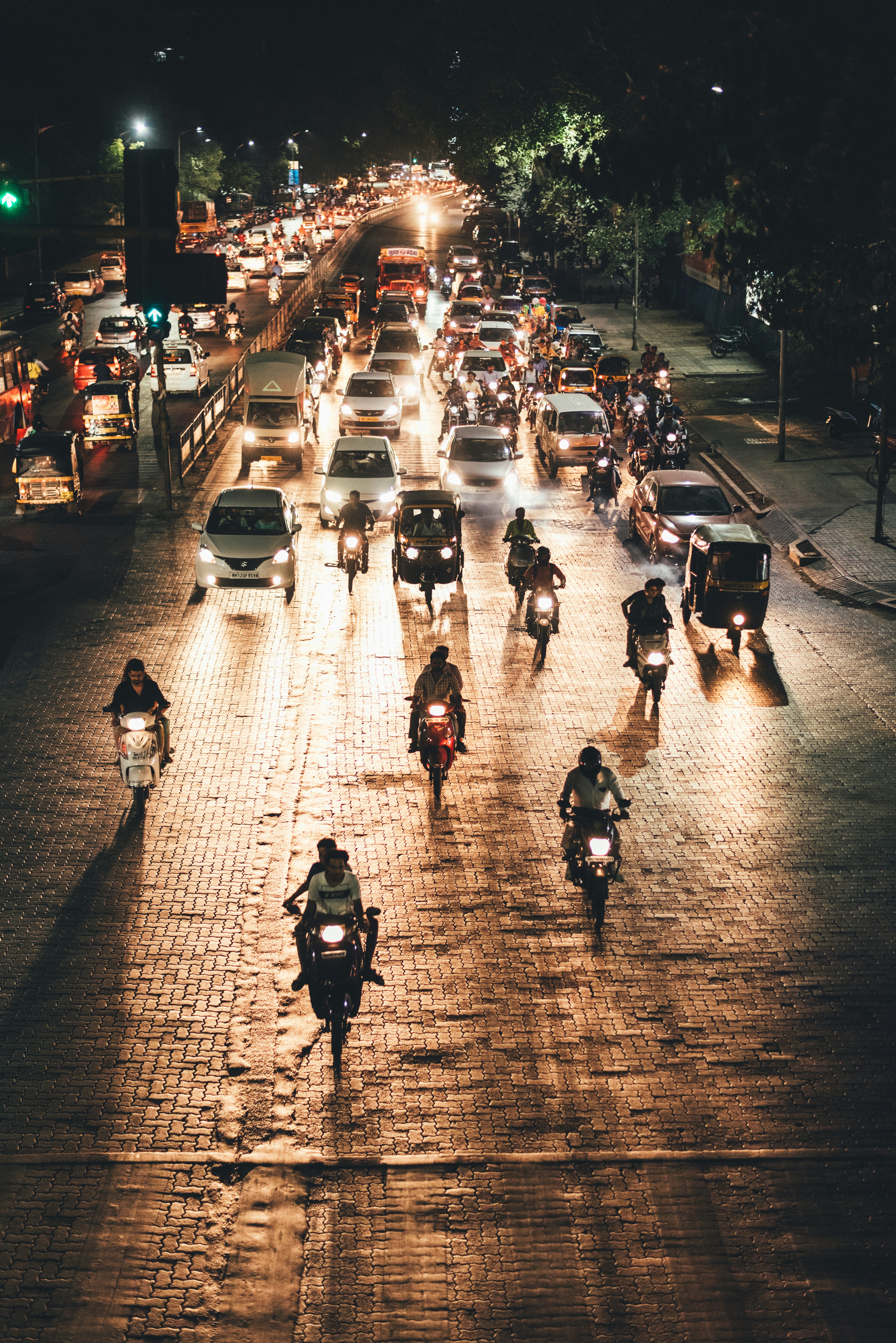 Vehicles on road during night time photo – Free Pune Image on Unsplash