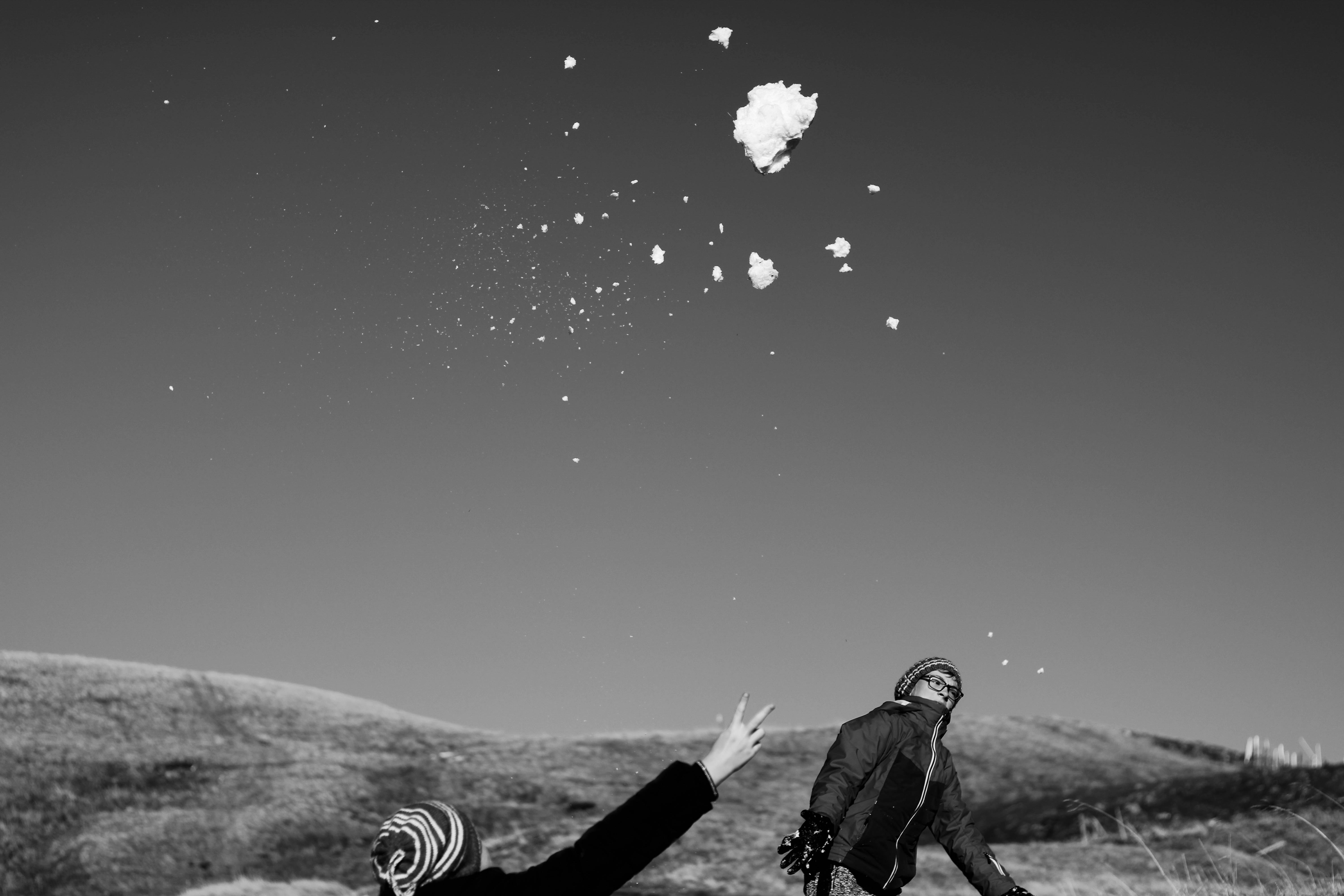 Snow Burst Over the Hilltop Duo in Mono