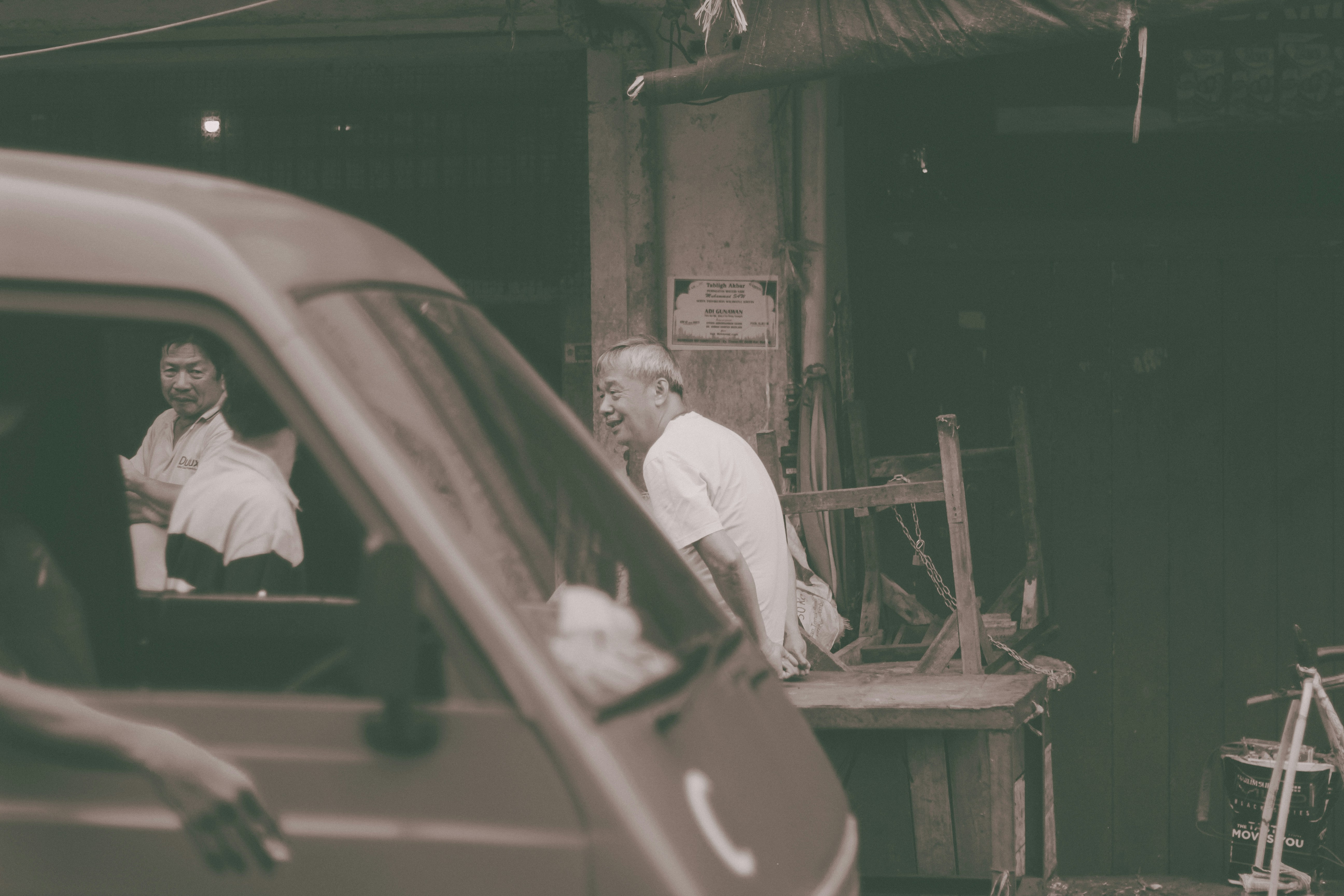 Urban Glimpse Through a Passing Van