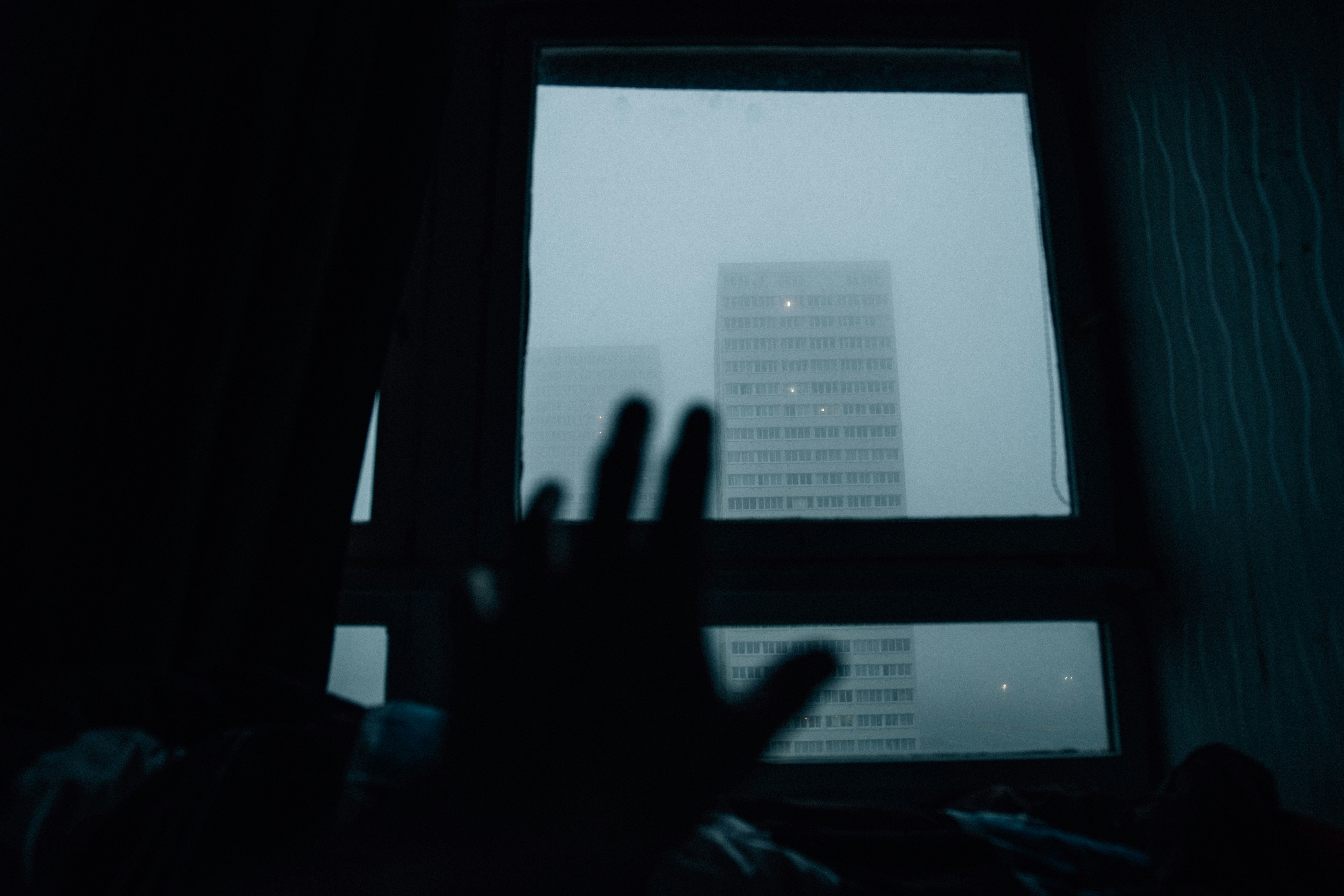 Silhouette of hand touching glass window photo – Free Fog Image on Unsplash
