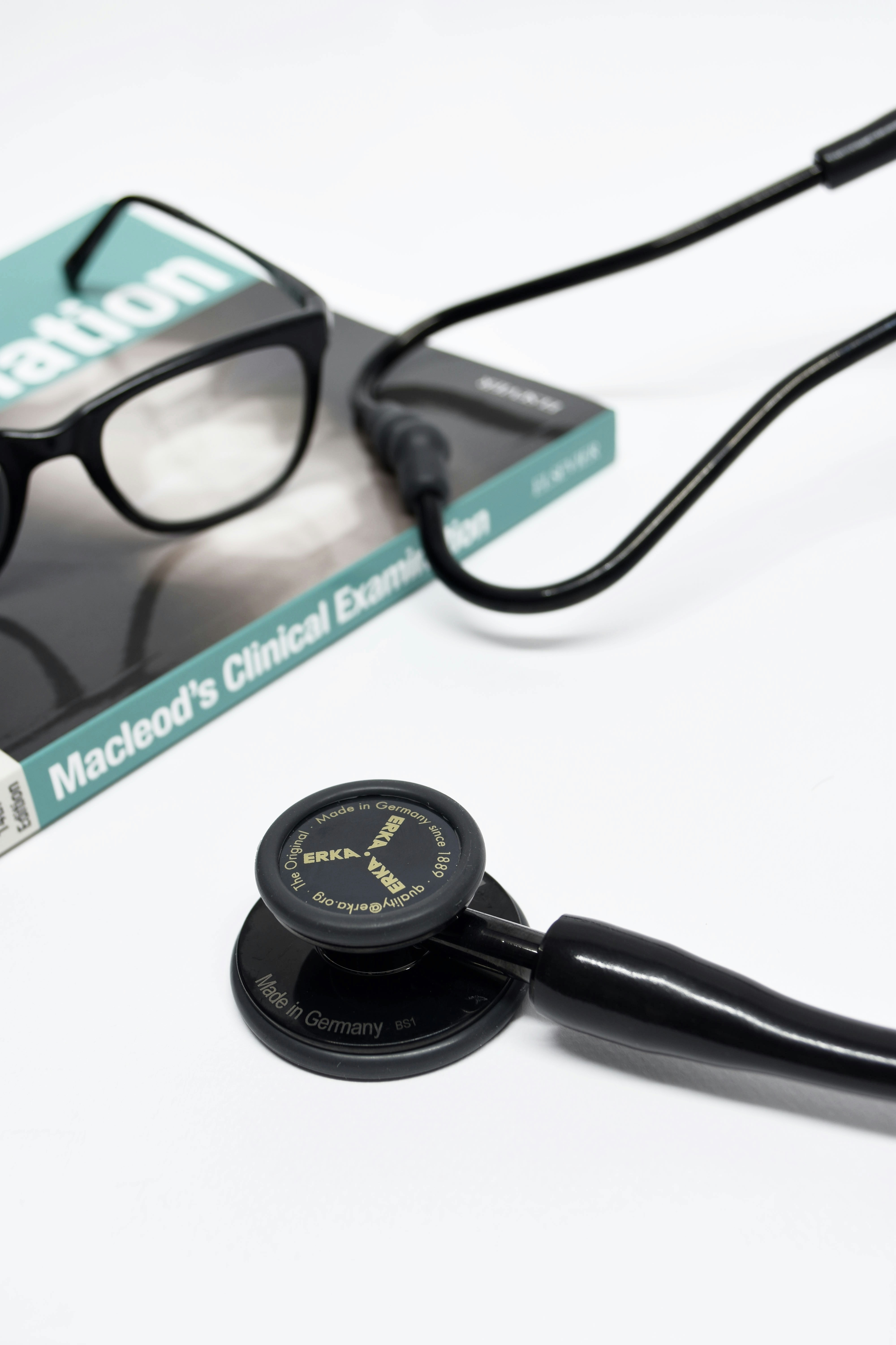 Morning Rounds: A Stethoscope and Glasses Beside MacLeod's Clinical Examination