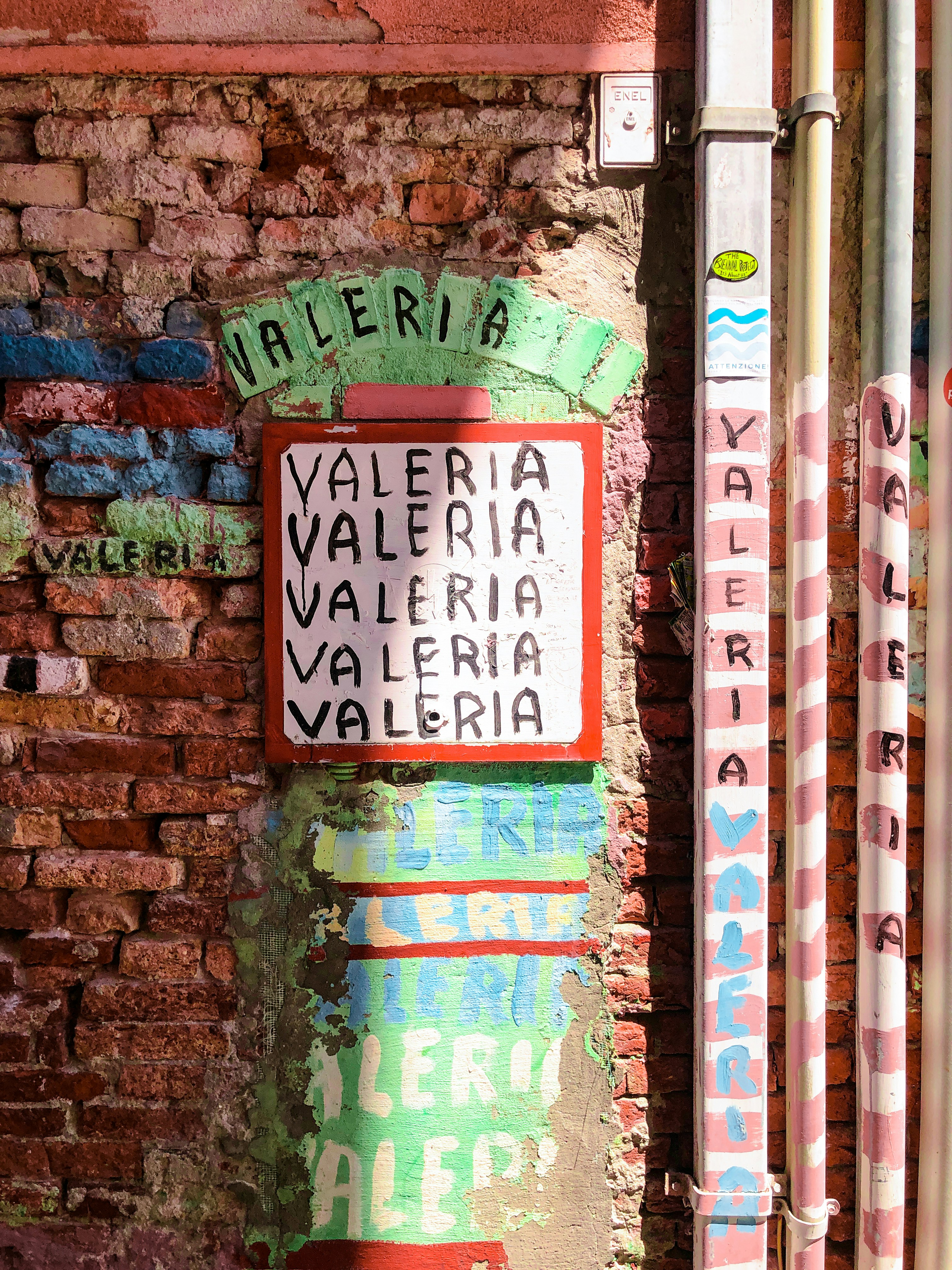 Valeria Shopfront Graffiti: A Patchwork of Color and Letters
