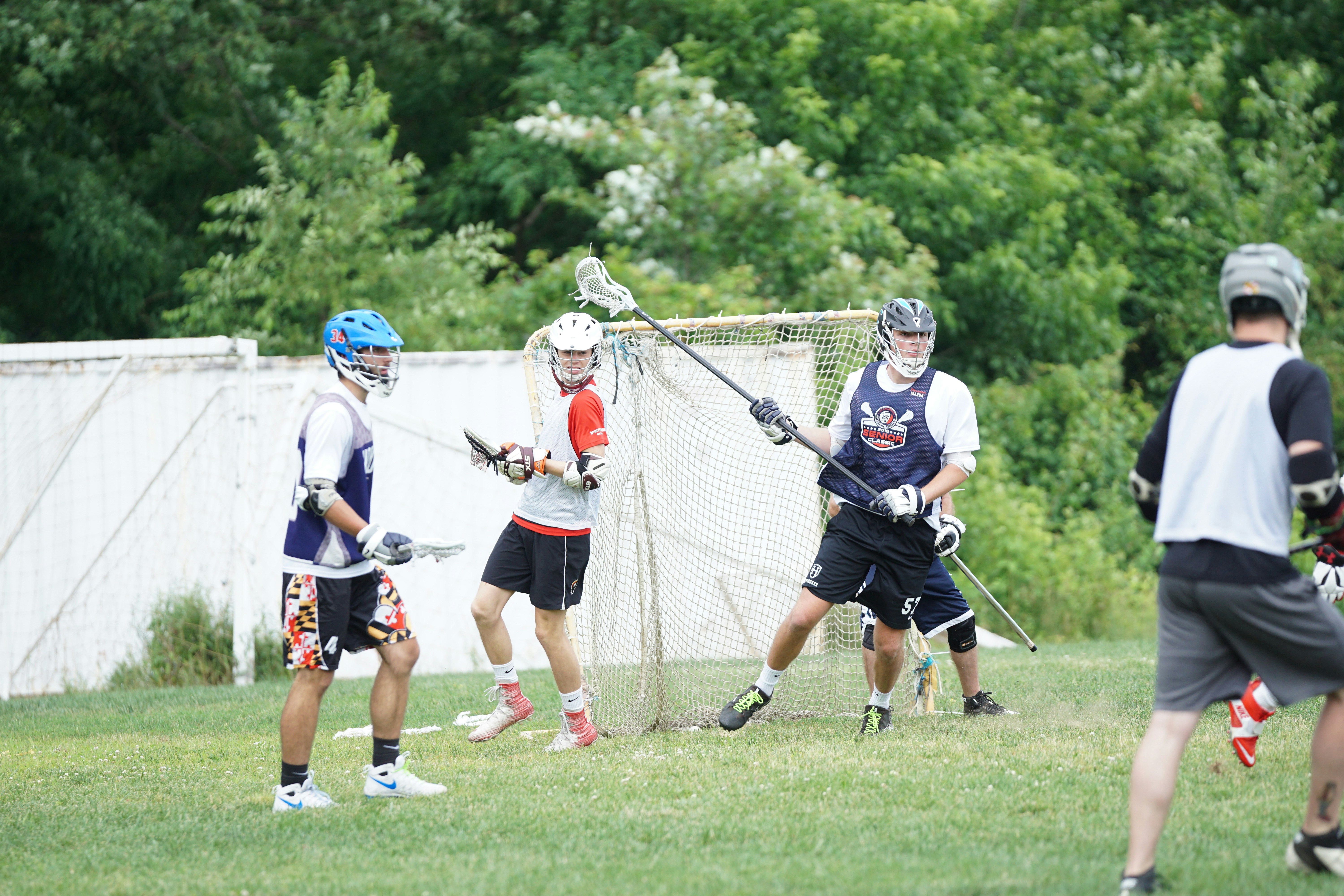Foto Gente jugando lacrosse – Imagen Persona gratis en Unsplash