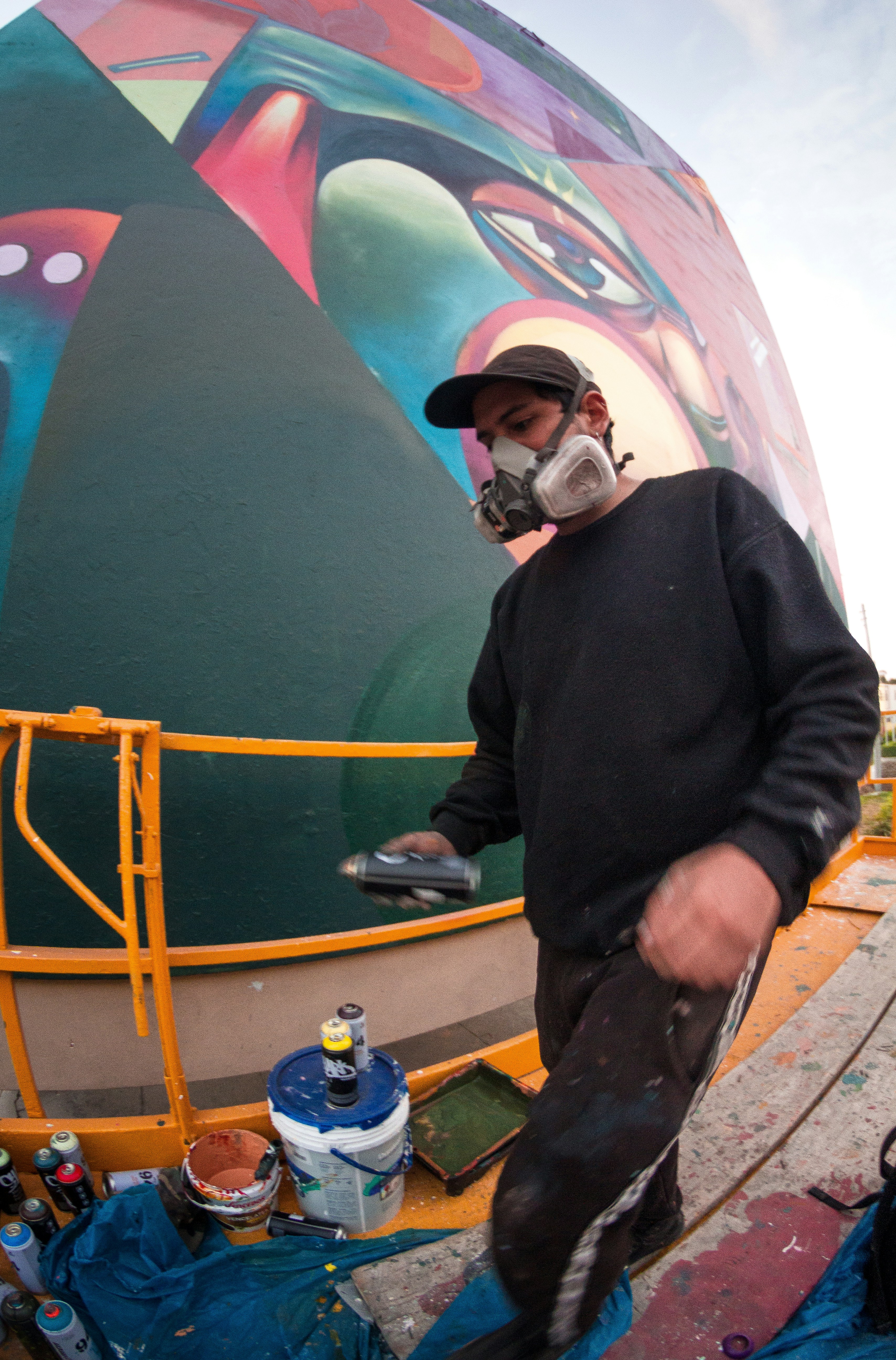 man standing near painstFrank Rolando Romero