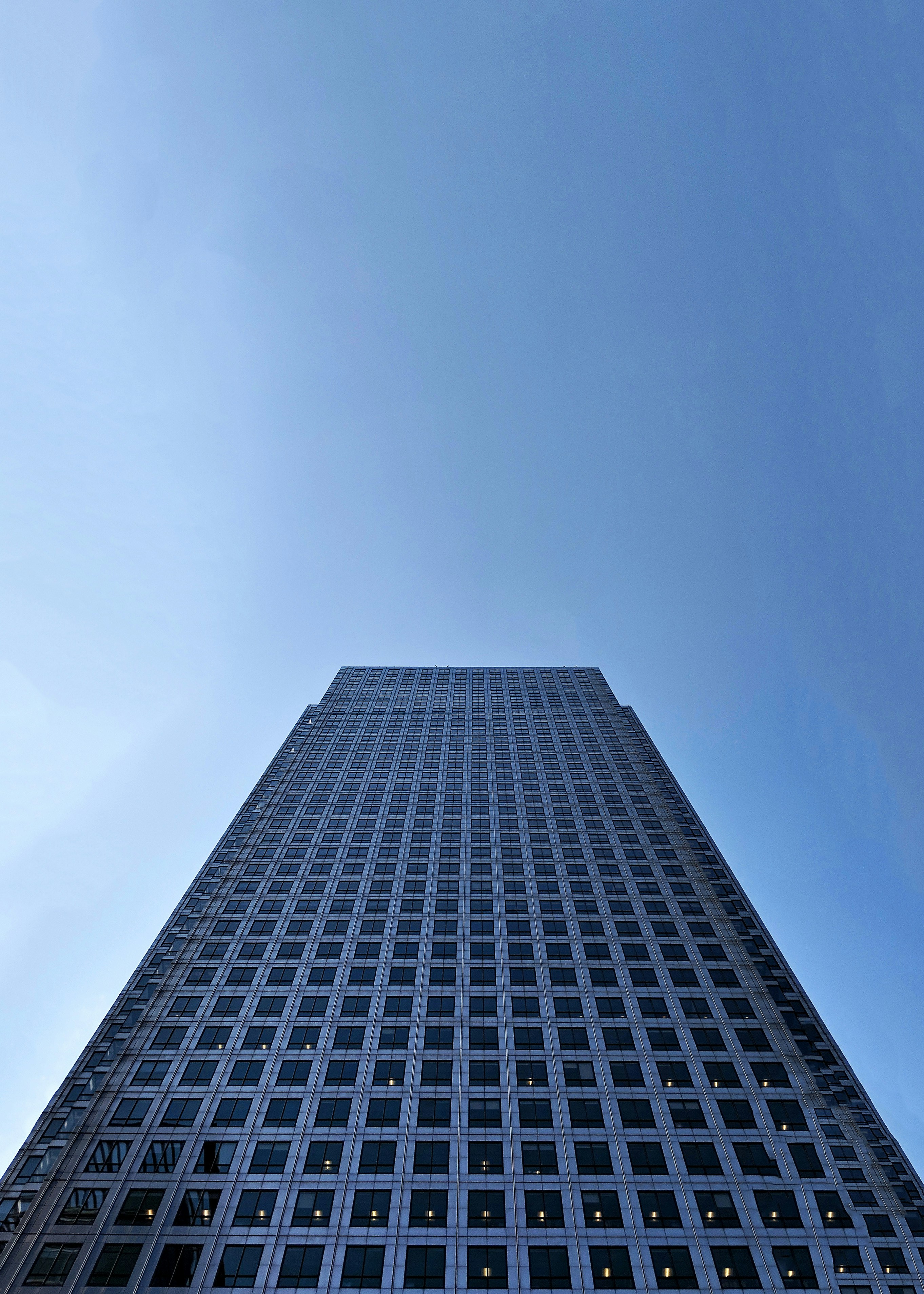 Worm's eye view photo of building photo – Free Blue Image on Unsplash