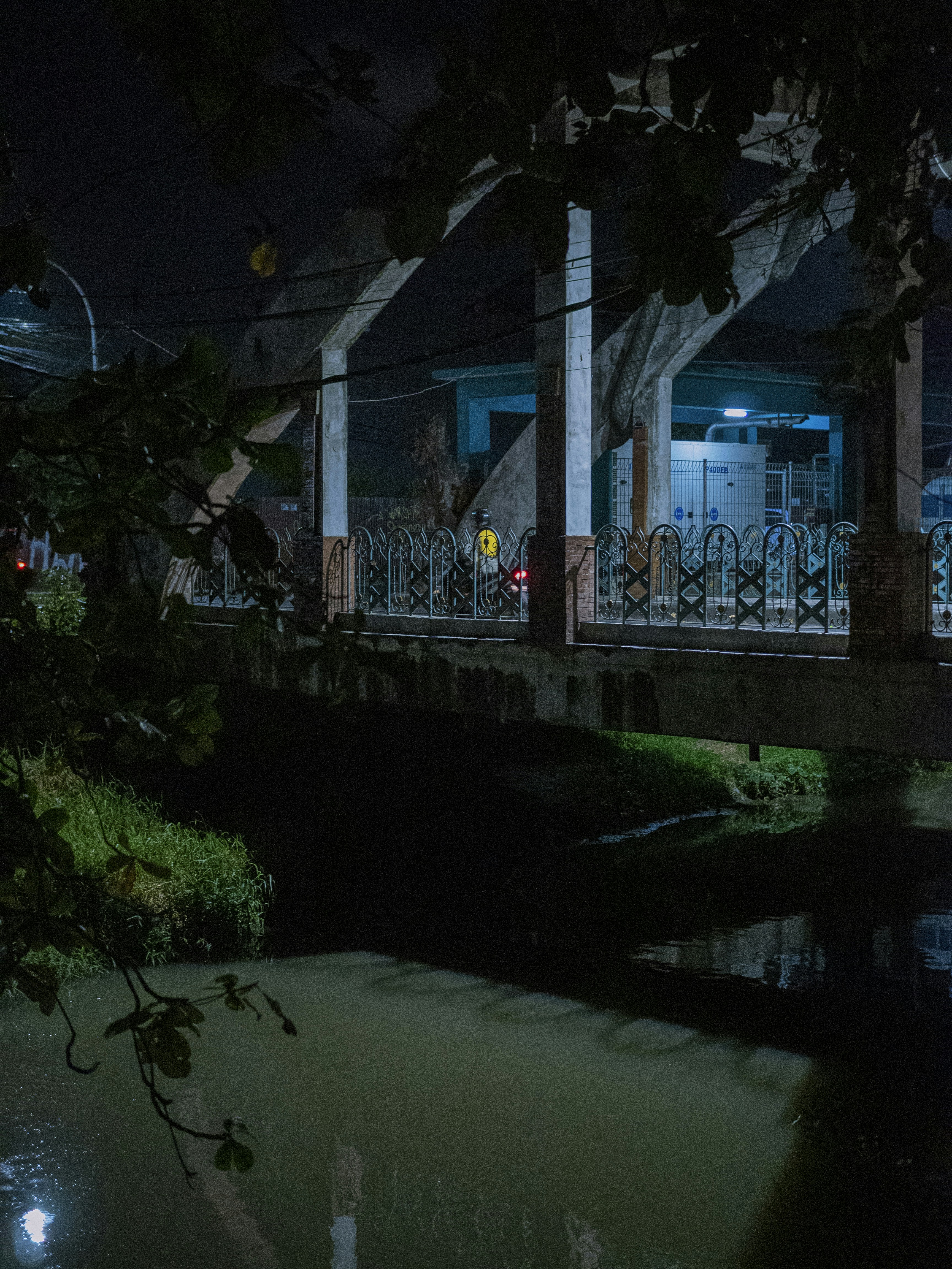 Moonlit Footbridge Over a Quiet Canal