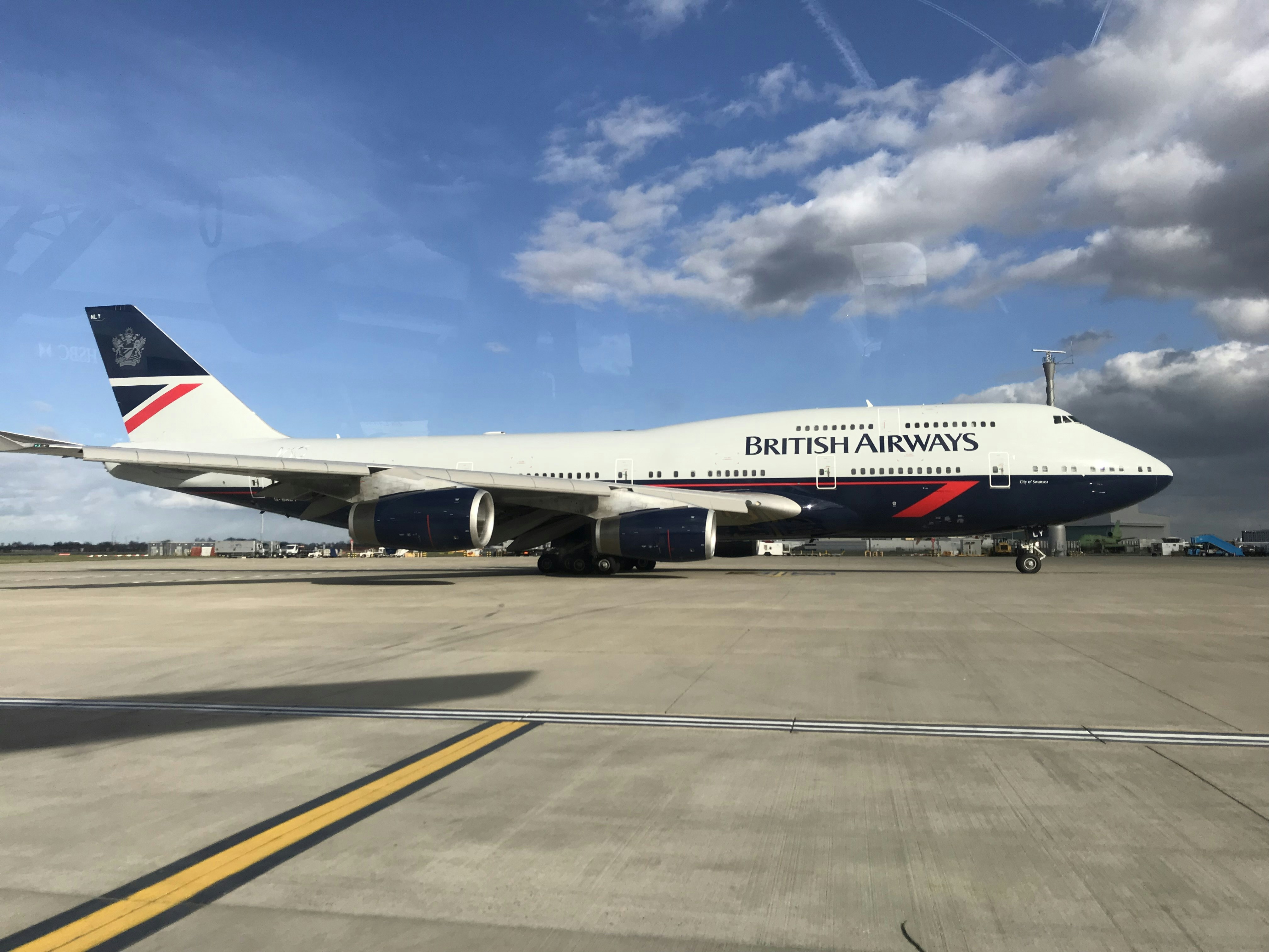 White and blue British Airways airliner on grey surface photo – Free ...