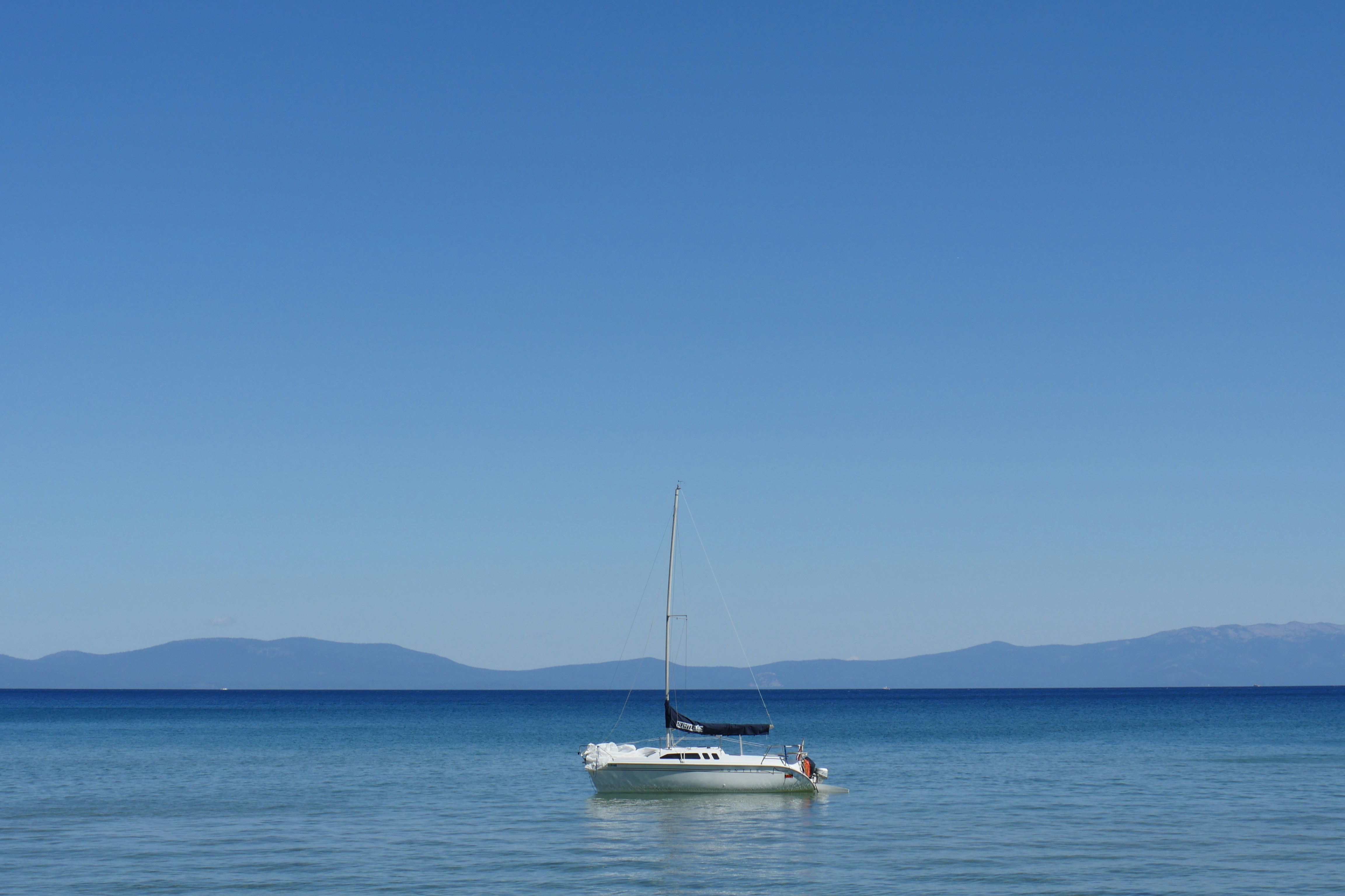 Sail boat on body of water during daytime photo – Free Blue Image on ...