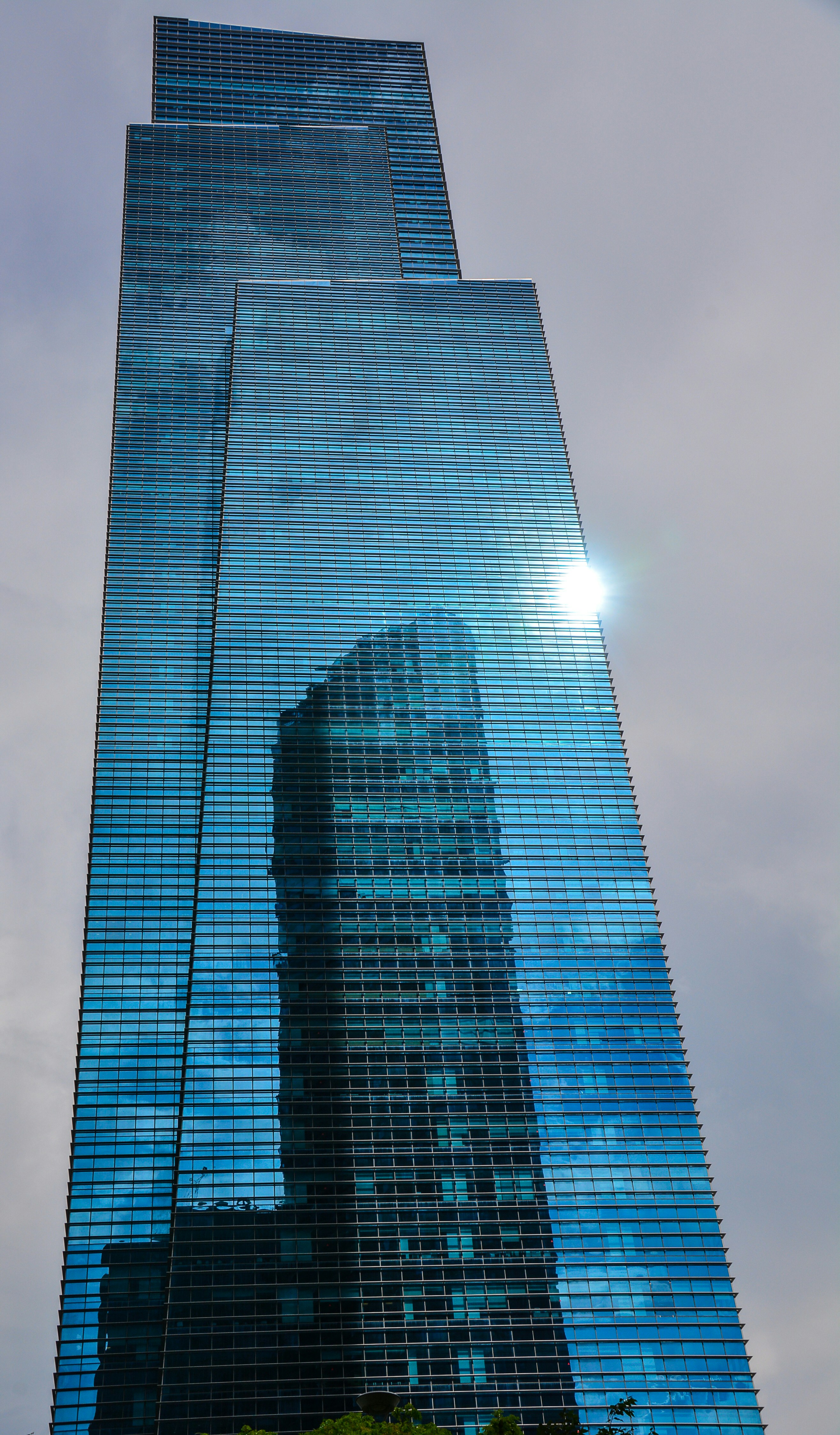 Twin Glass Pinnacle: Sunlit Reflections on a Skyscraper