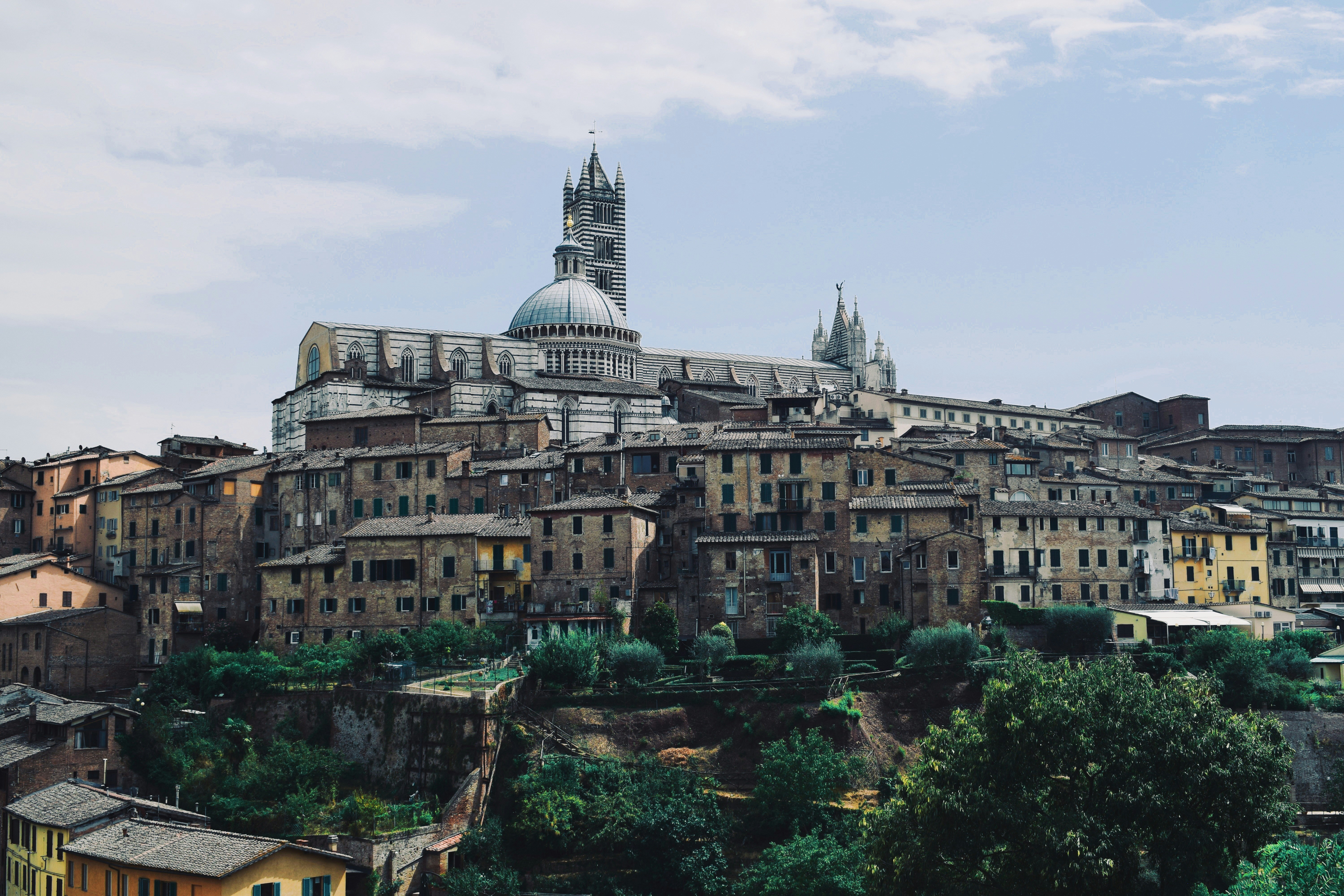 Dome Crown over a Terraced Italian Hilltown