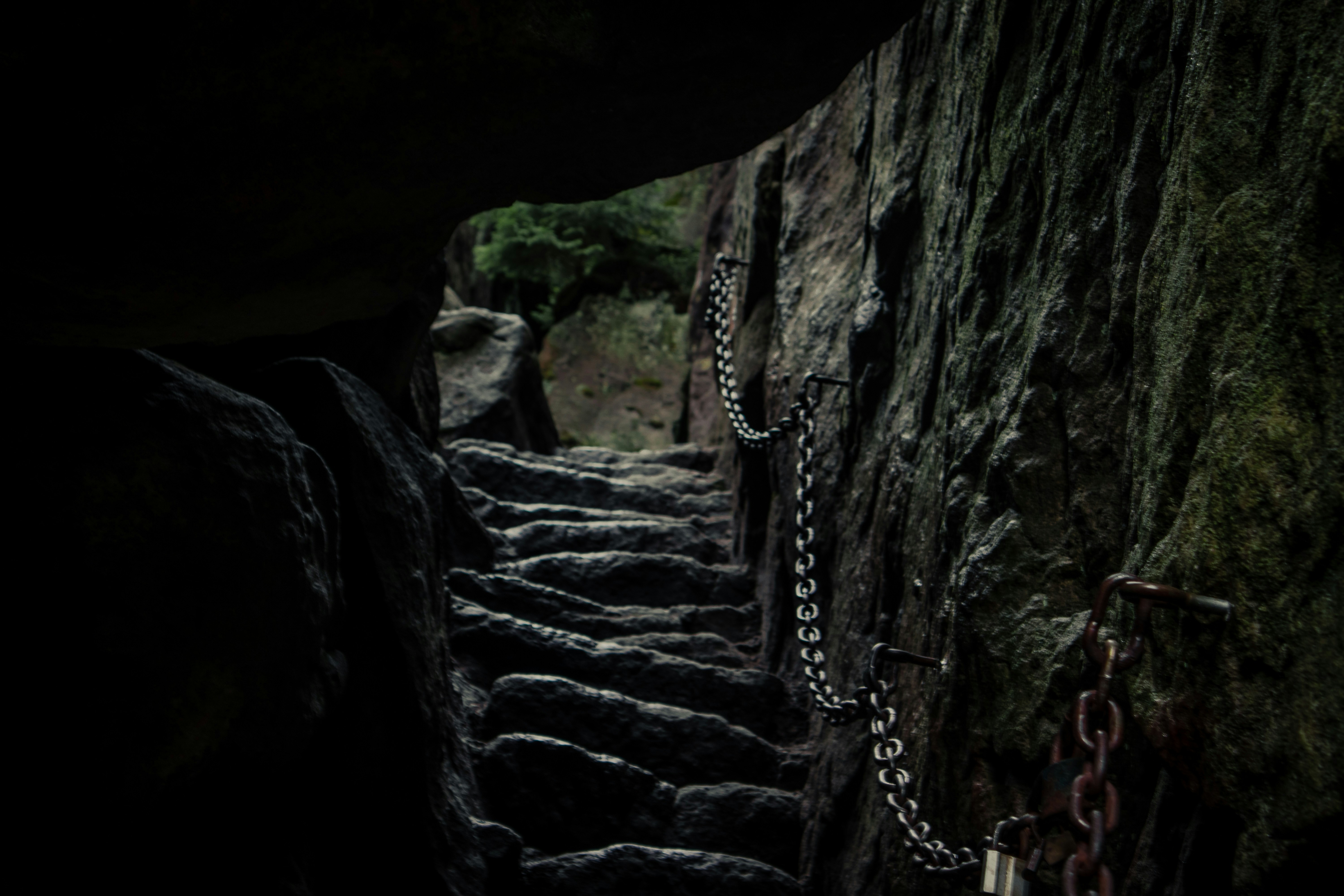 Shadowed Passage: Chains and Stone Stairs to LightAnna Hunko