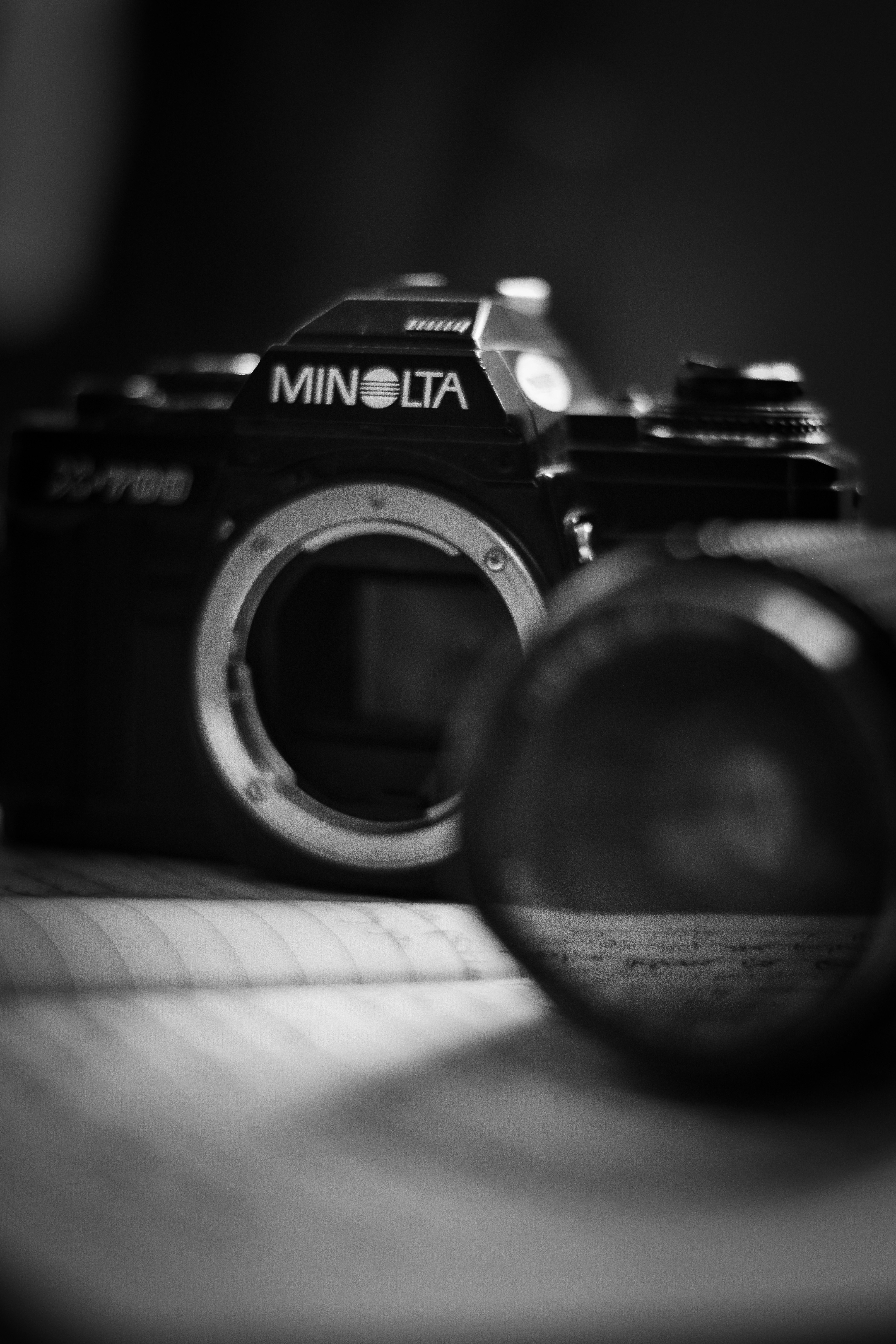 Monochrome Vintage: Minolta SLR with Open Mount and Foreground Lens Cap
