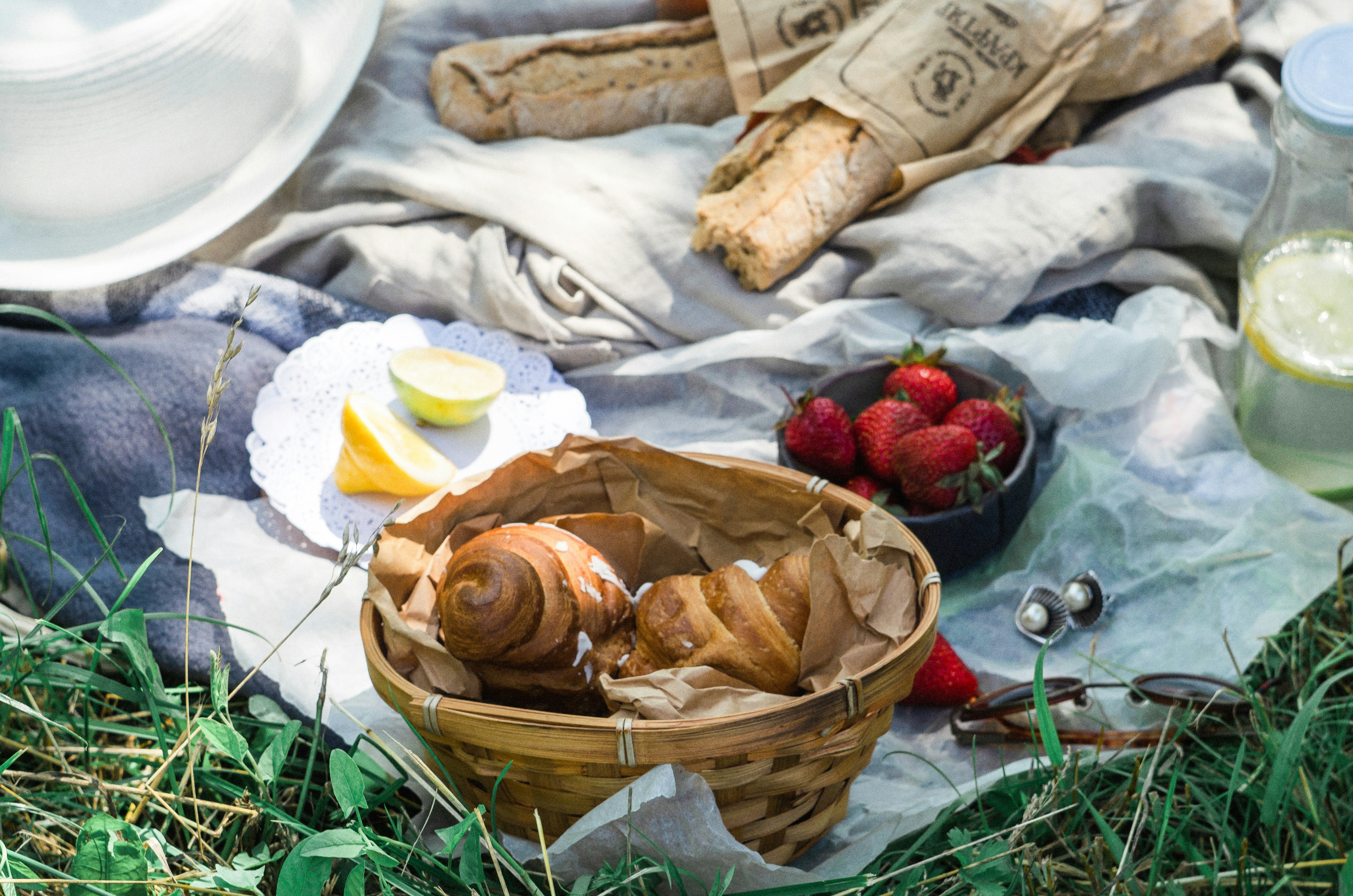 Golden Croissants on a Lively Picnic Blanket