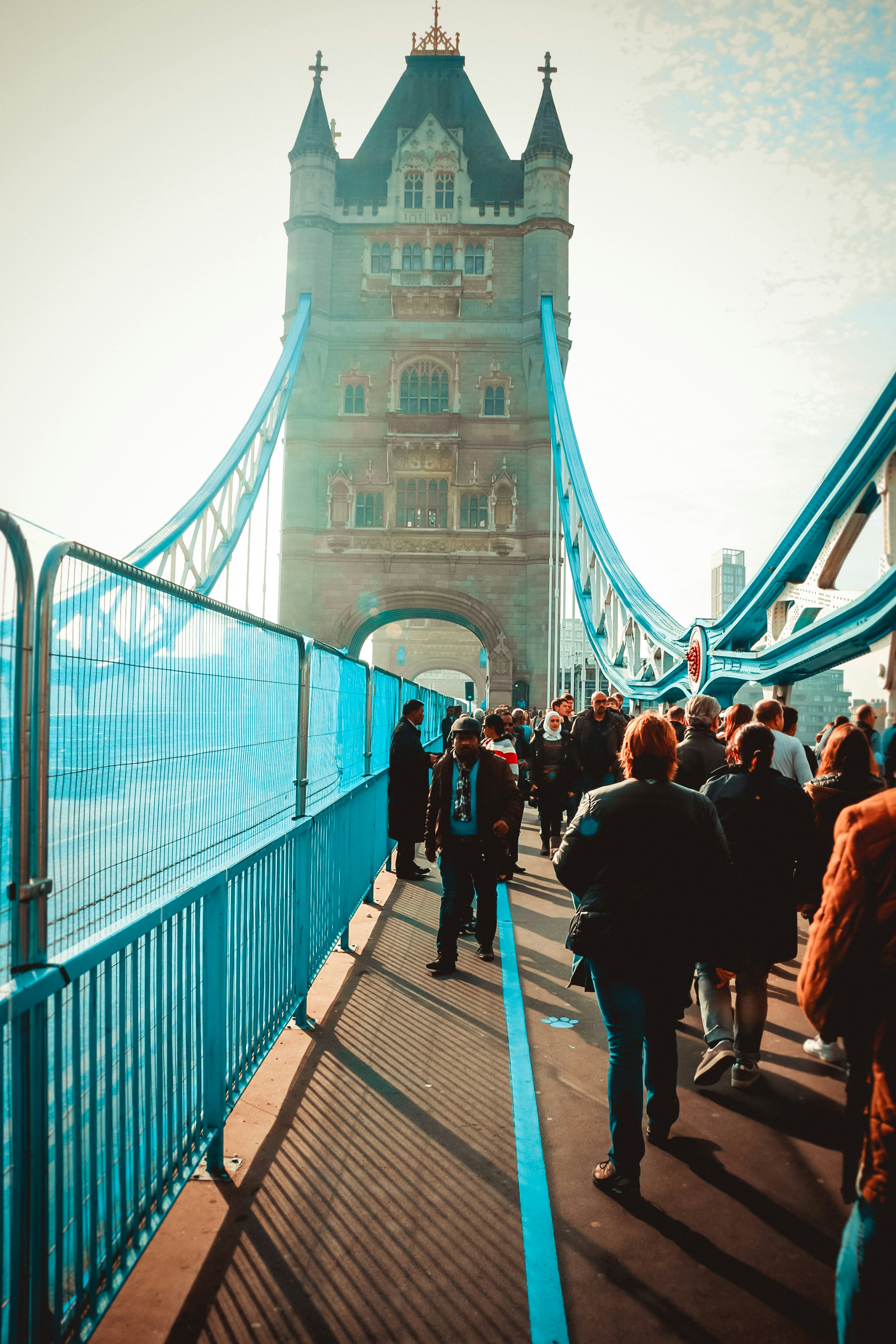 Group of people walking on bridge during daytime photo – Free People ...