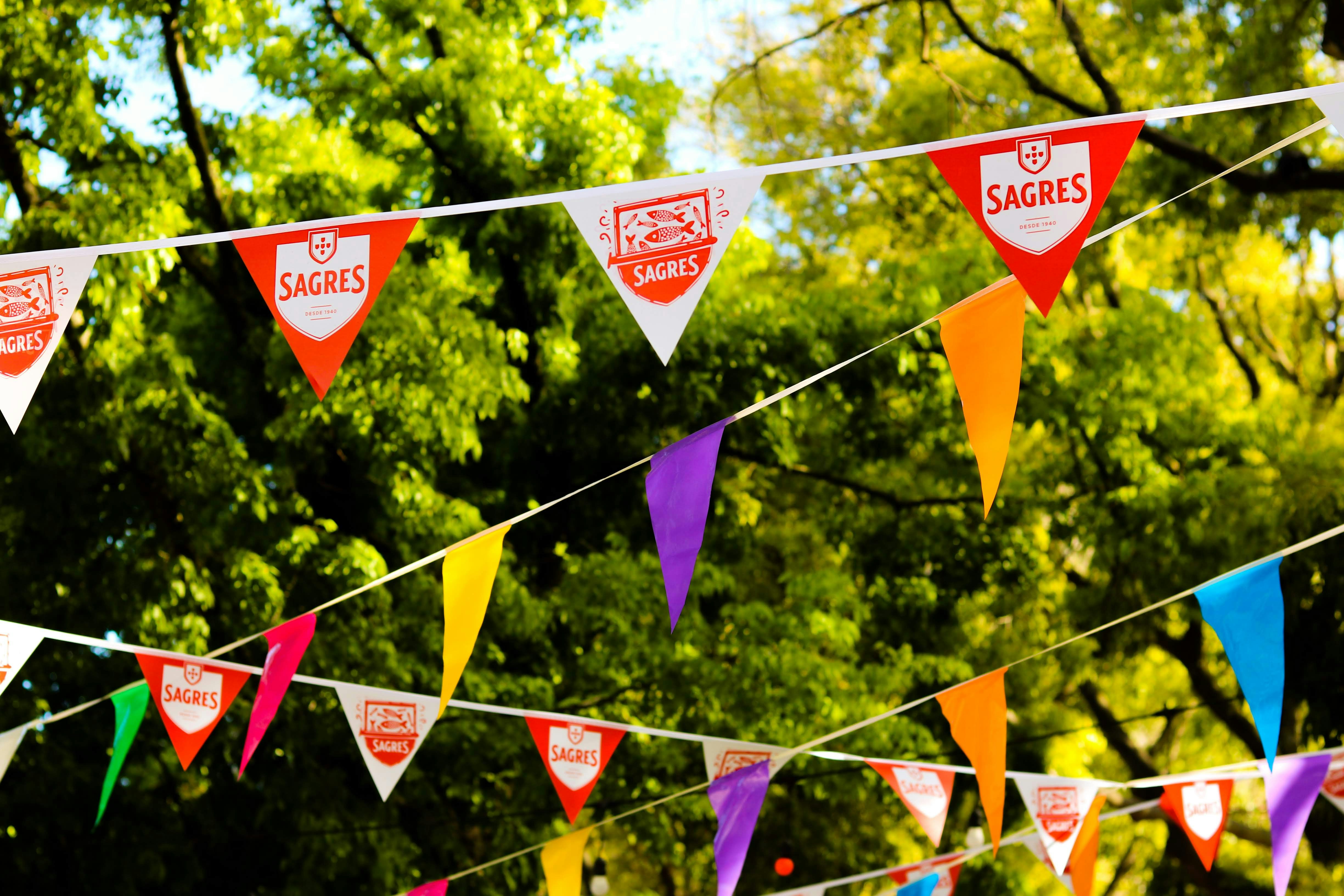 Assorted-color buntings photo – Free Crowd Image on Unsplash