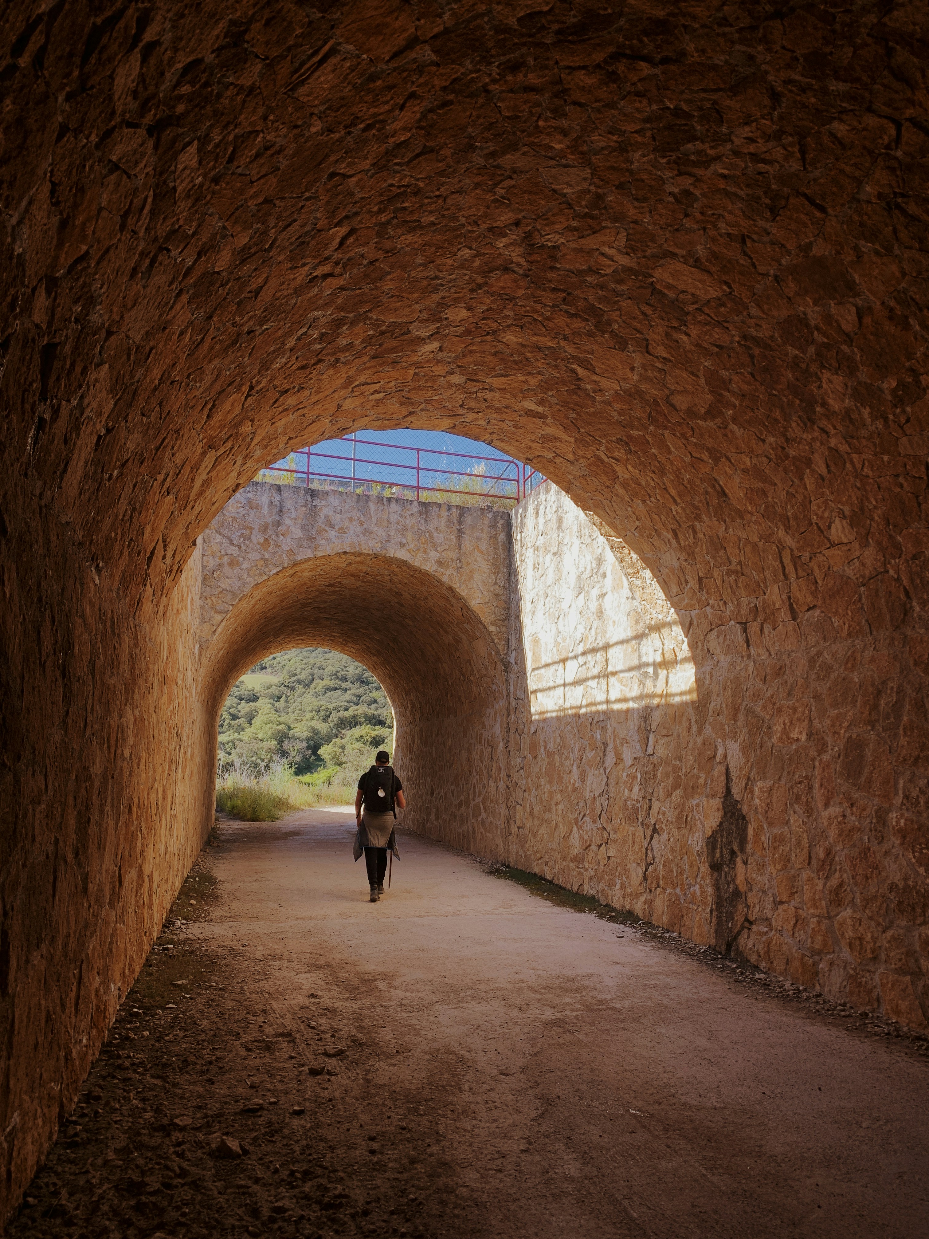 Two person walking on pathway photo – Free Person Image on Unsplash