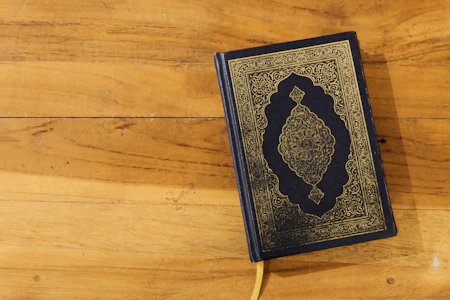 Ornate Tome Resting on a Honeyed Wooden Floor