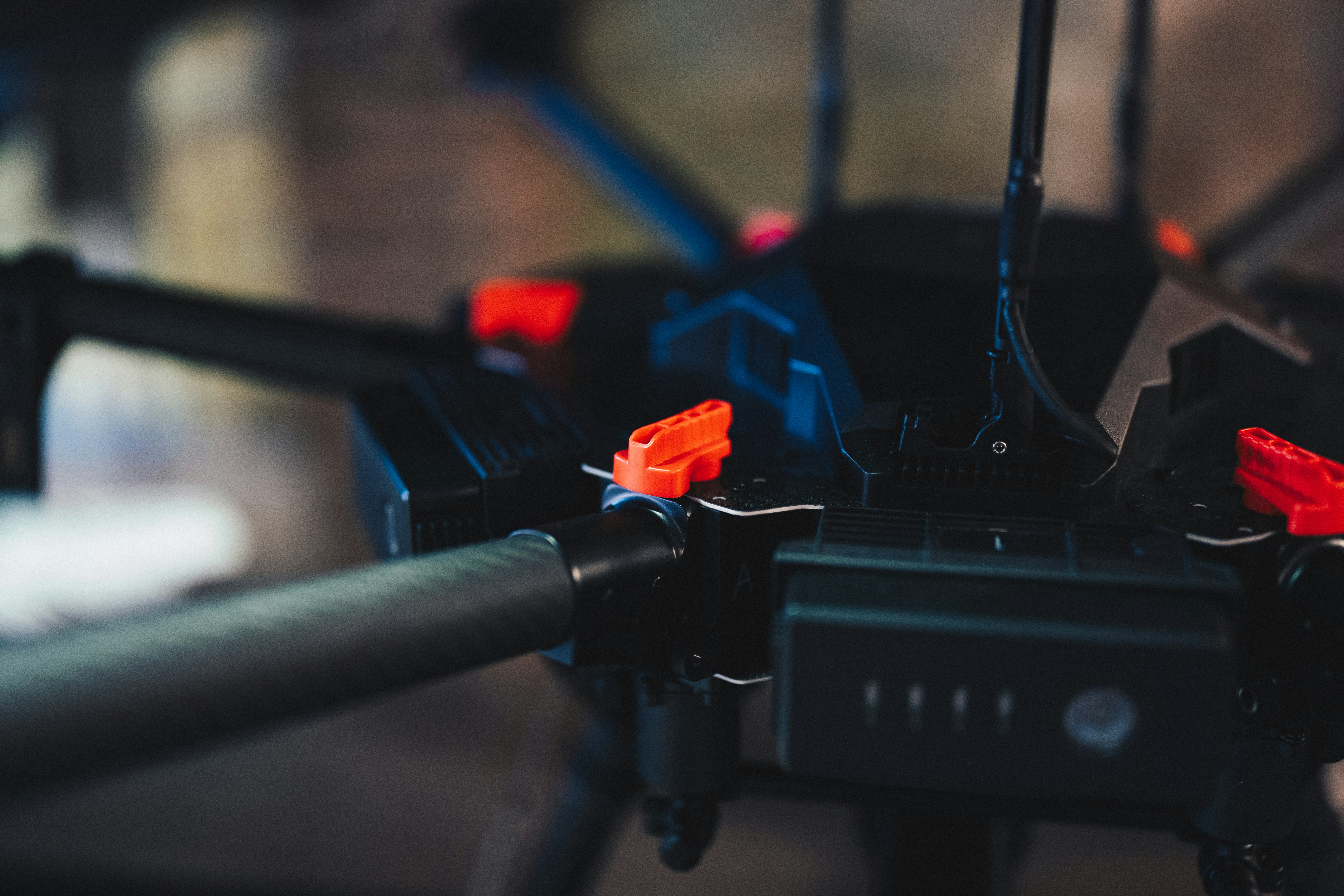 A close up of a black and red device photo – Free Machine Image on Unsplash