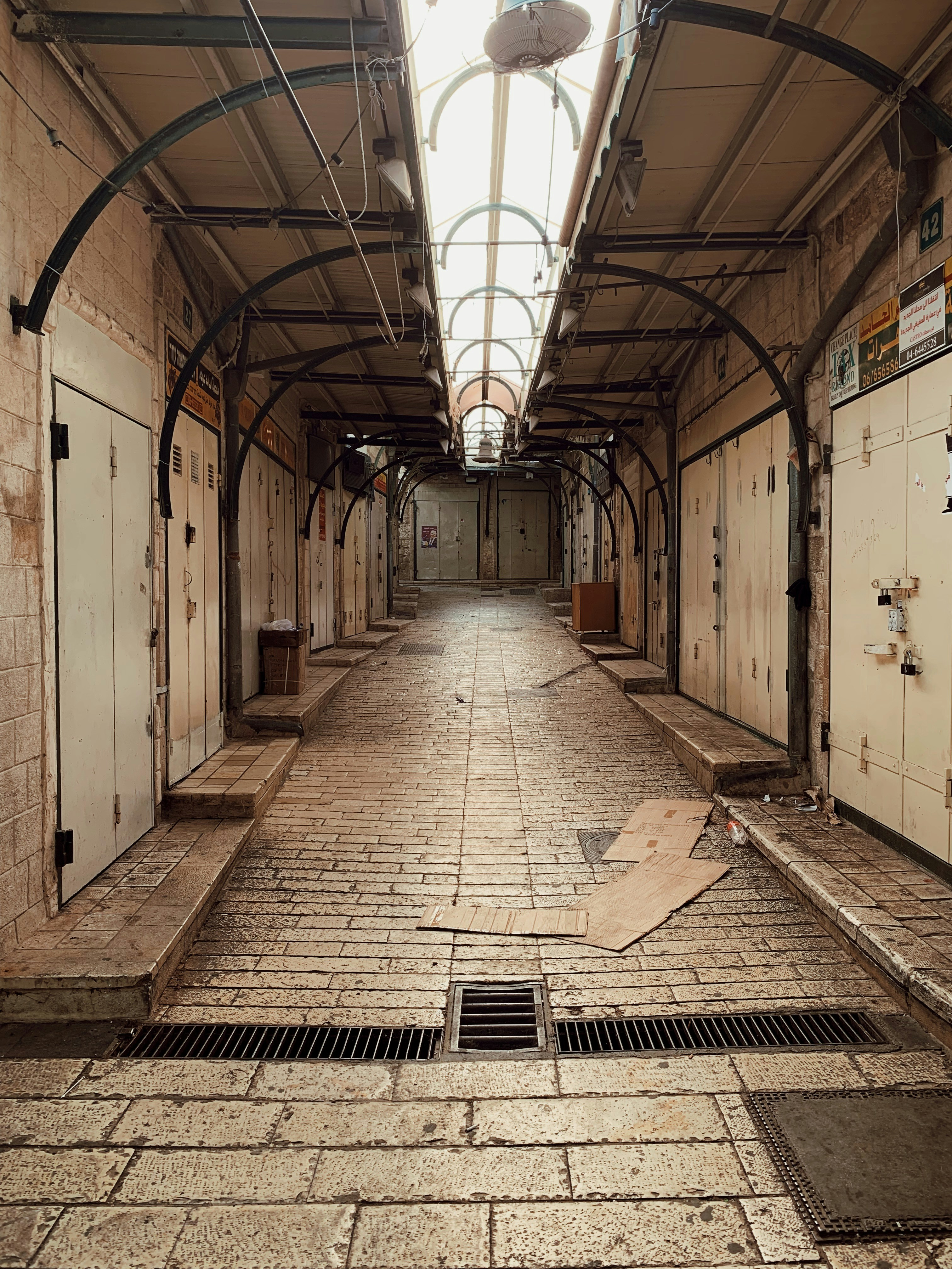 Brown concrete pavement photo – Free Corridor Image on Unsplash