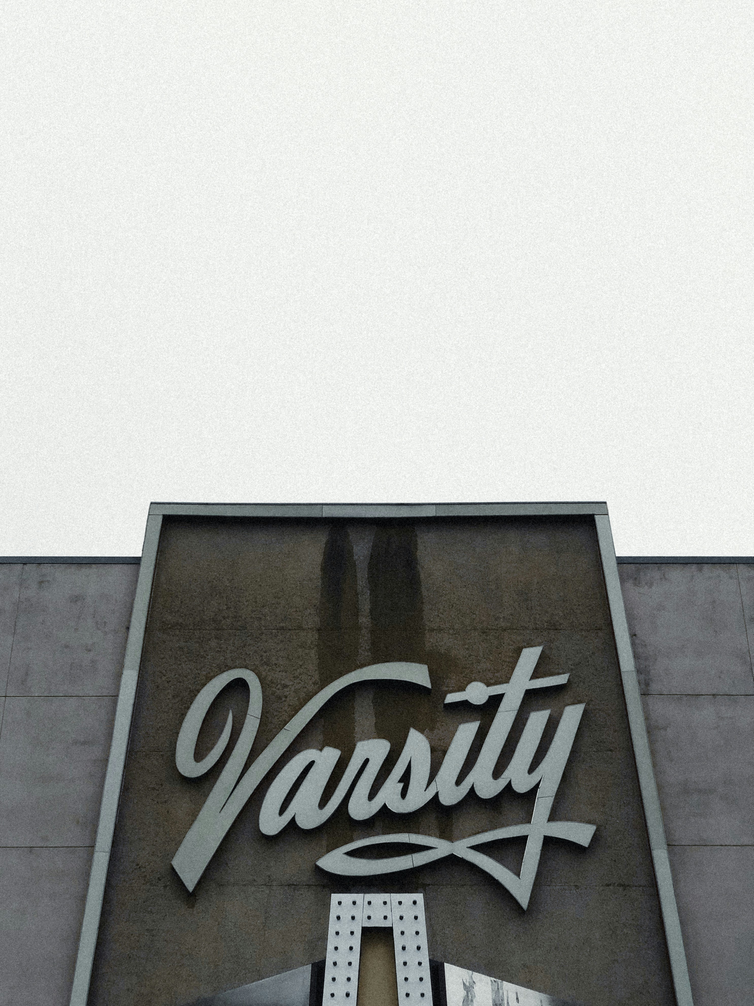 White and grey Varsity signage photo – Free White Image on Unsplash