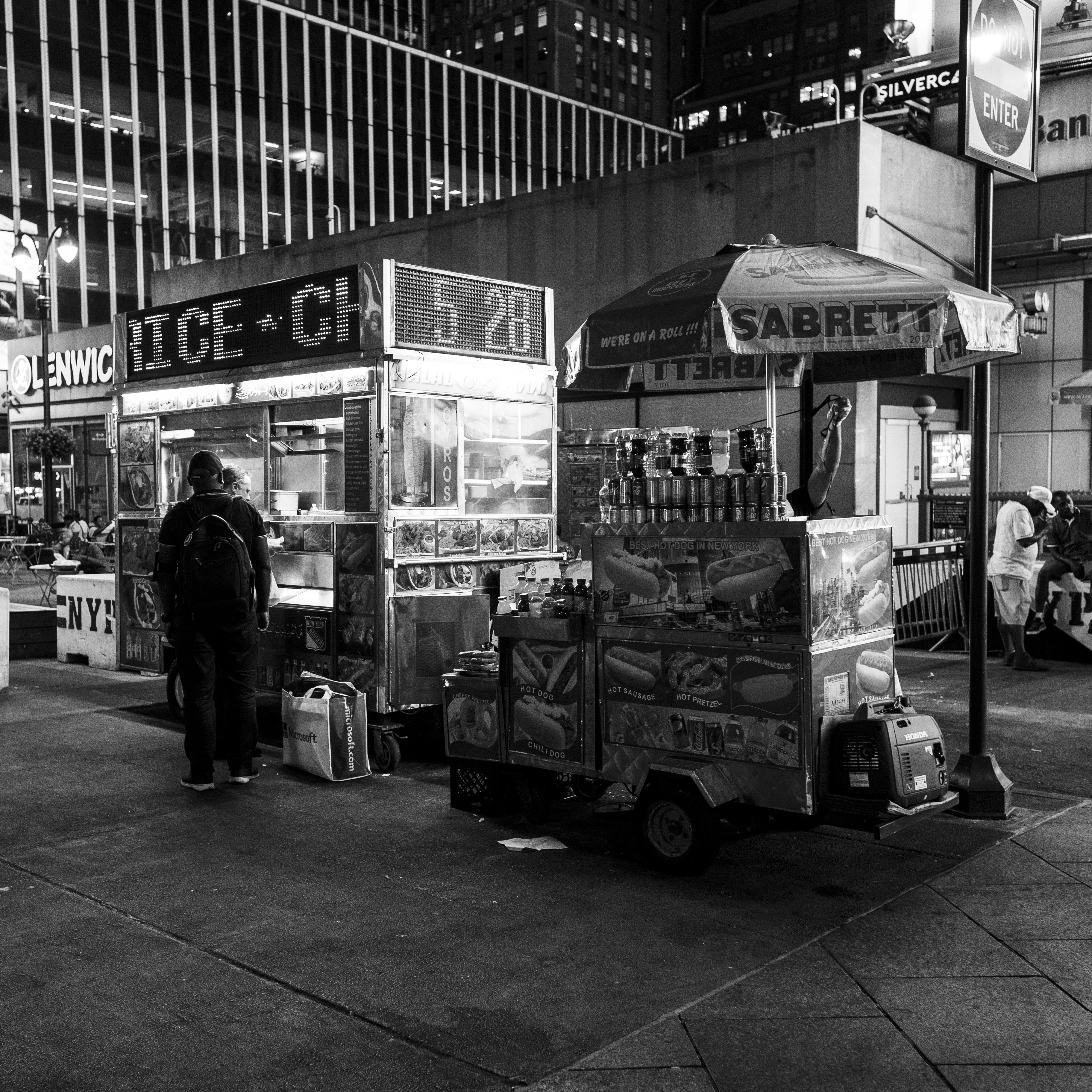 Man standing food stall photo – Free Transportation Image on Unsplash
