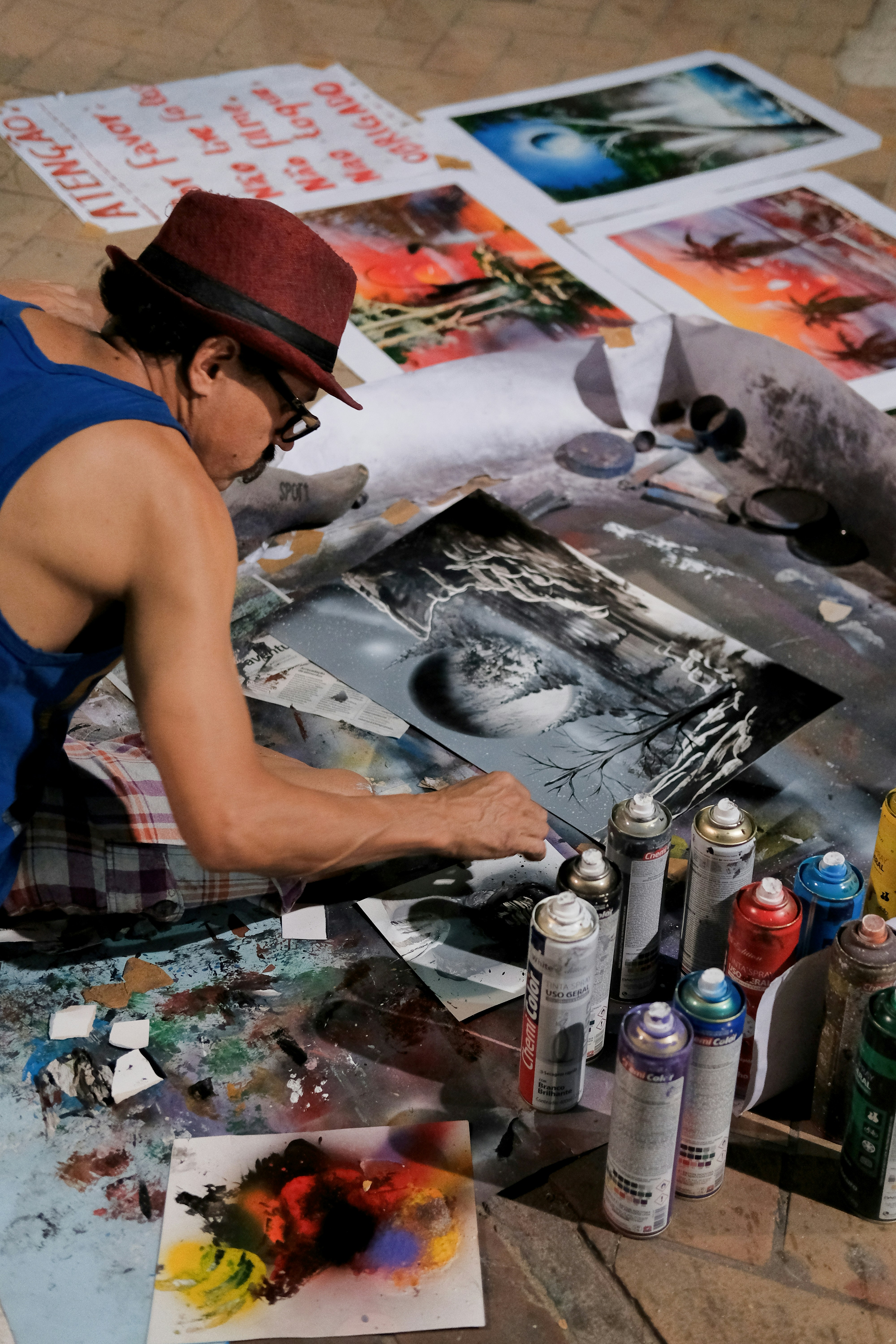 Studio of Color: A Graffiti Artist at Work on a Colorful Mosaic