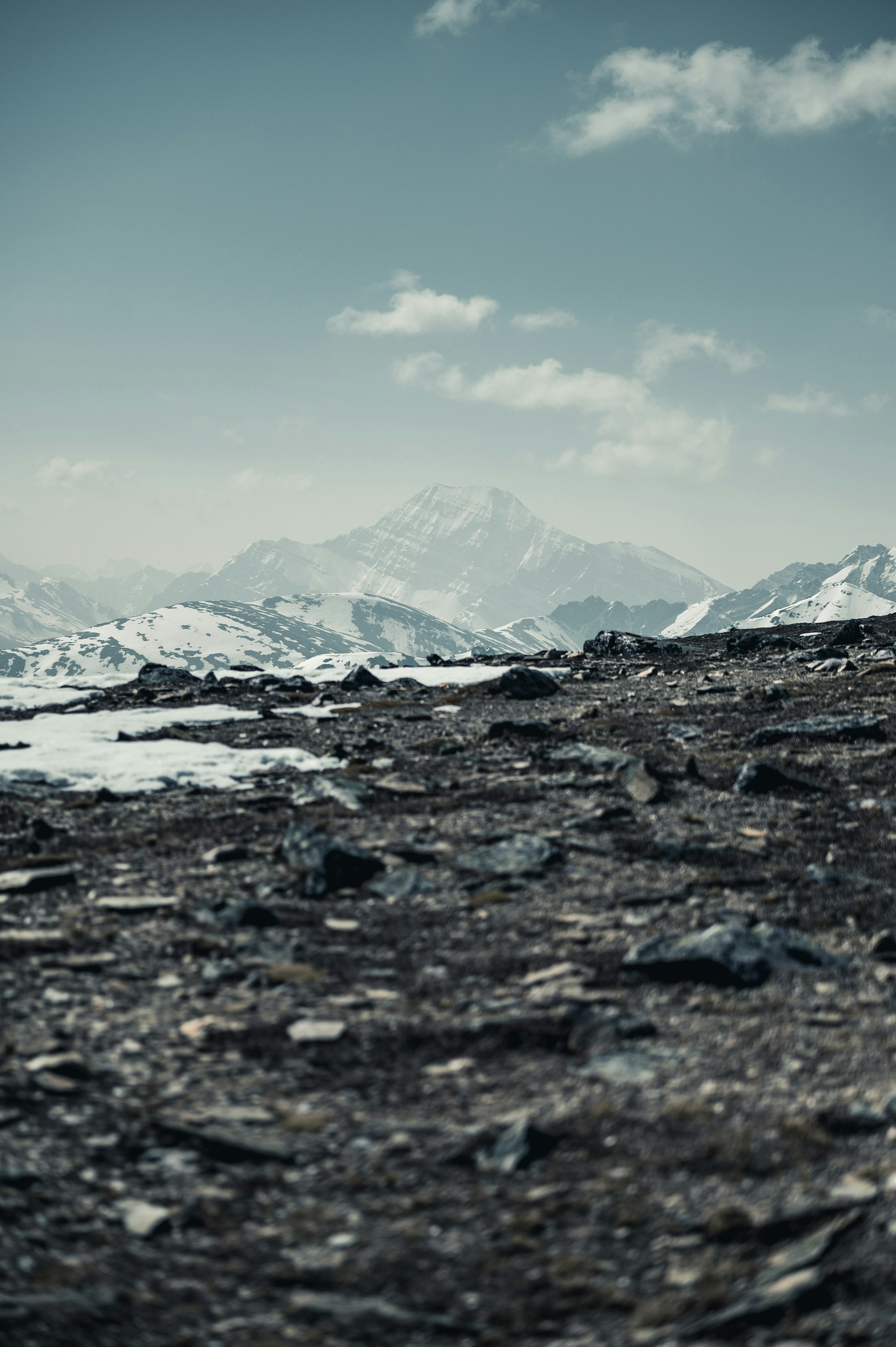 Moonlit Rim: Snow-Dusted Ridge Beneath a Quiet Sky
