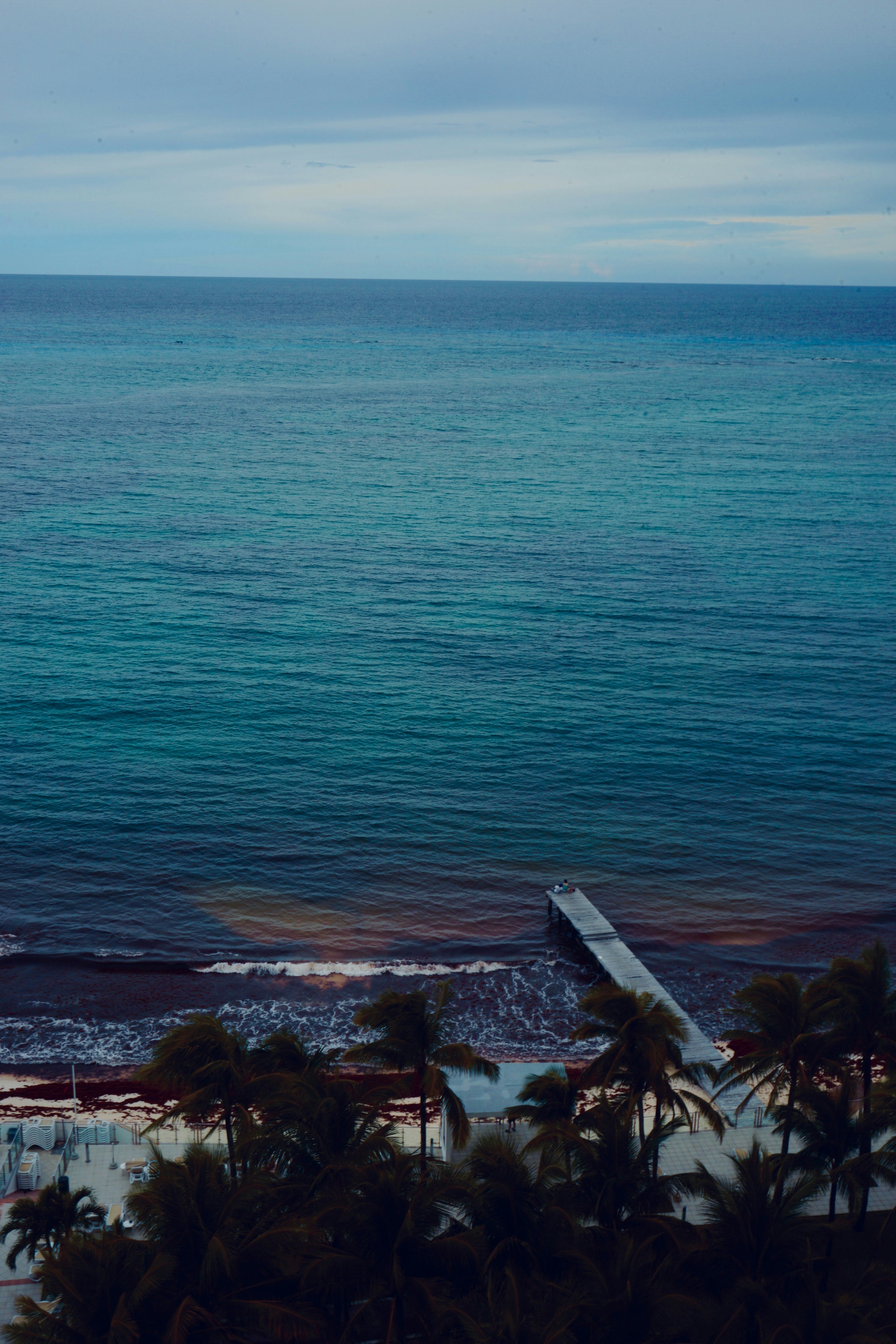 Coastal Pier Reaching into Turquoise Seas